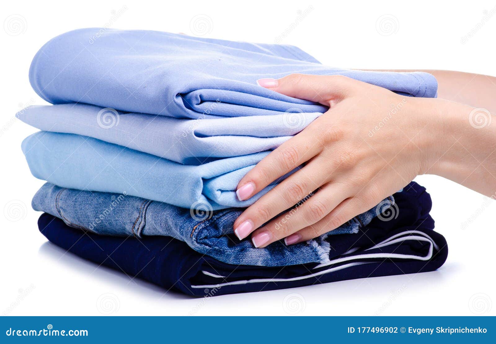 Stack Blue Folded Clothing In Hand Stock Image | CartoonDealer.com ...