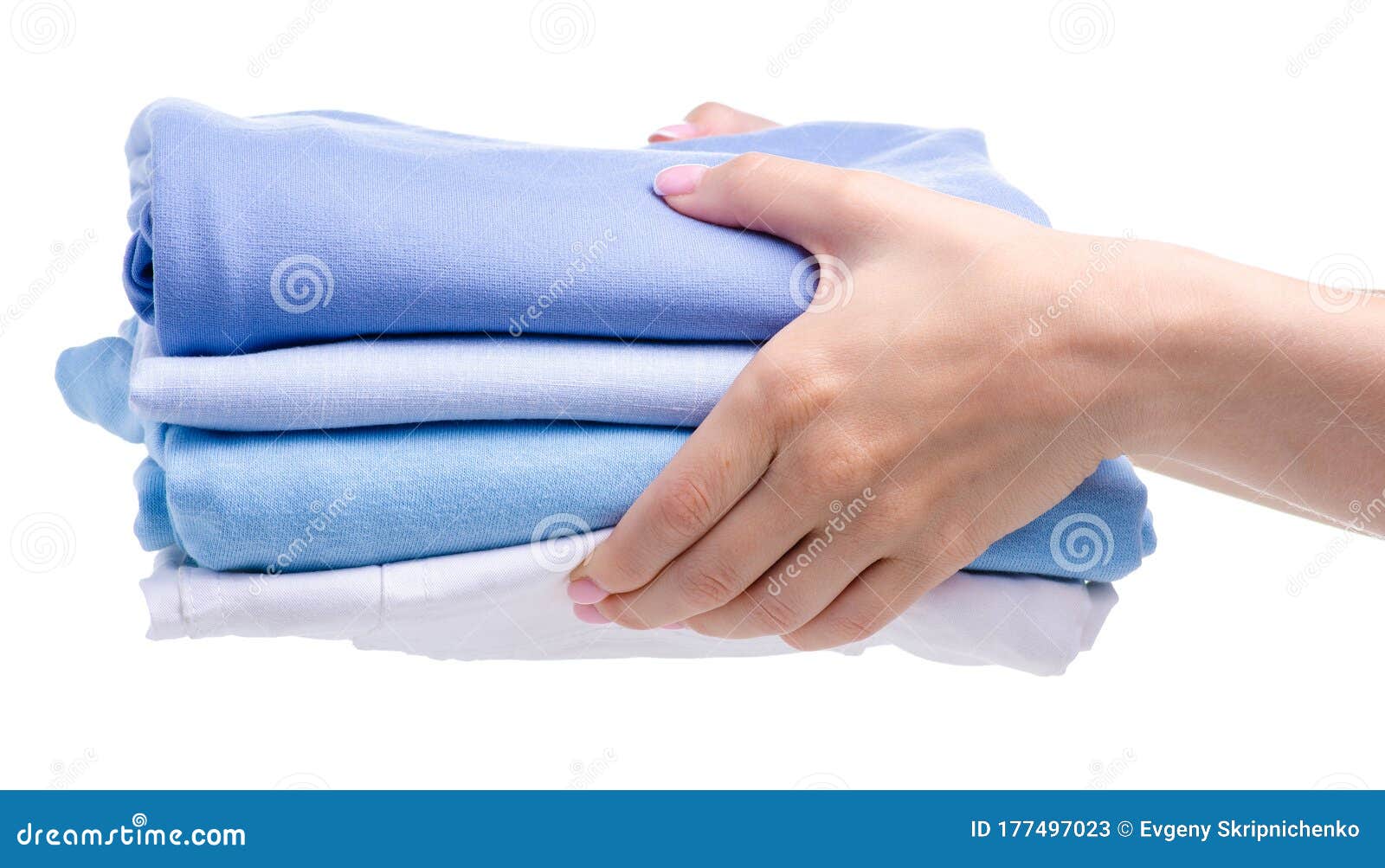 Stack Blue Folded Clothing in Hand Stock Image - Image of garment ...