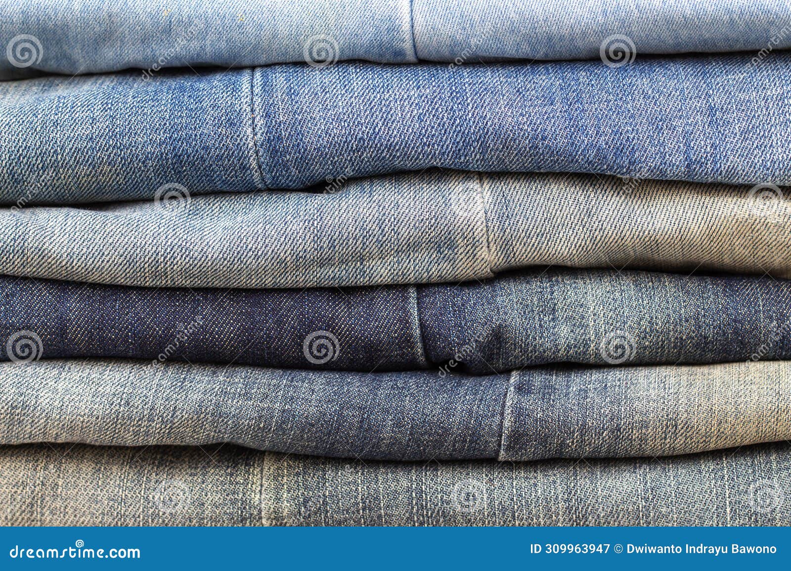 Stack of Blue Jeans with Different Color Characters Stock Image - Image ...