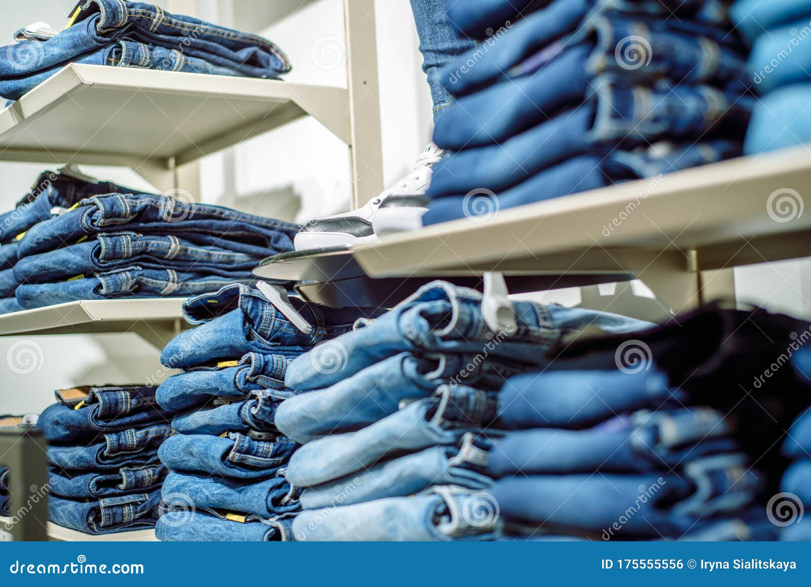 Stack of Blue Jeans in a Shop. Jeans Store Clearance Stock Photo ...