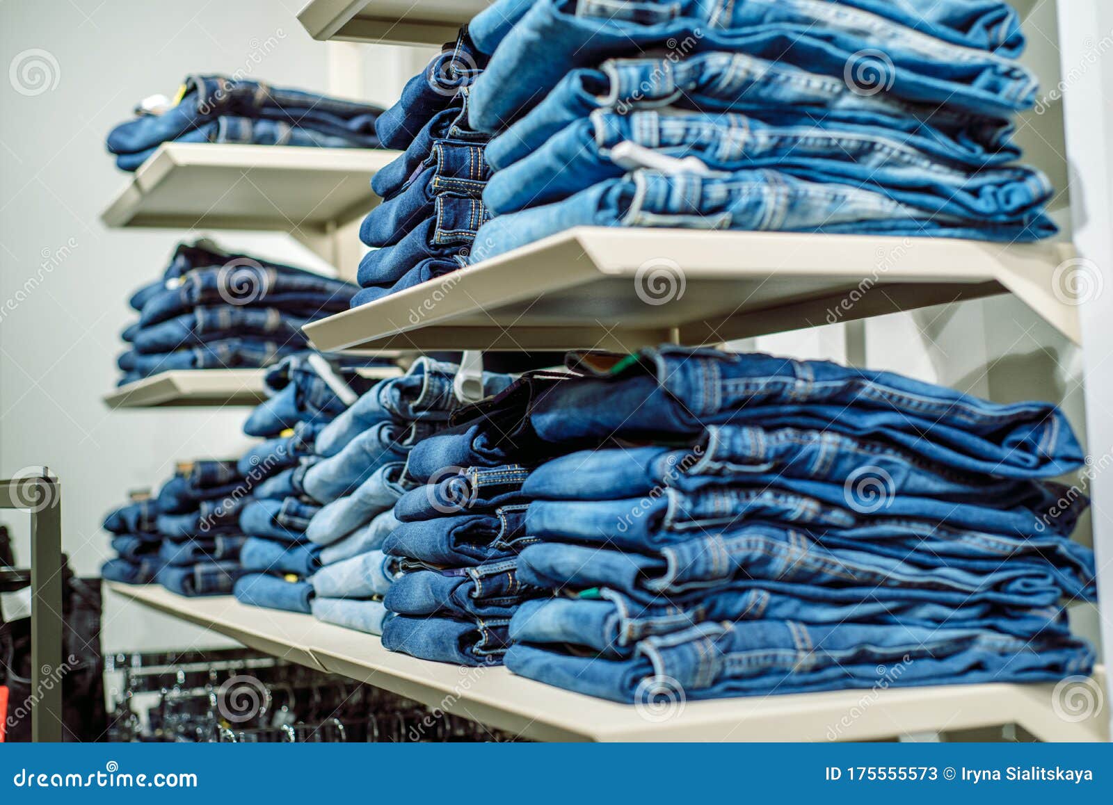 Stack of Blue Jeans in a Shop. Jeans Store Clearance Stock Image ...