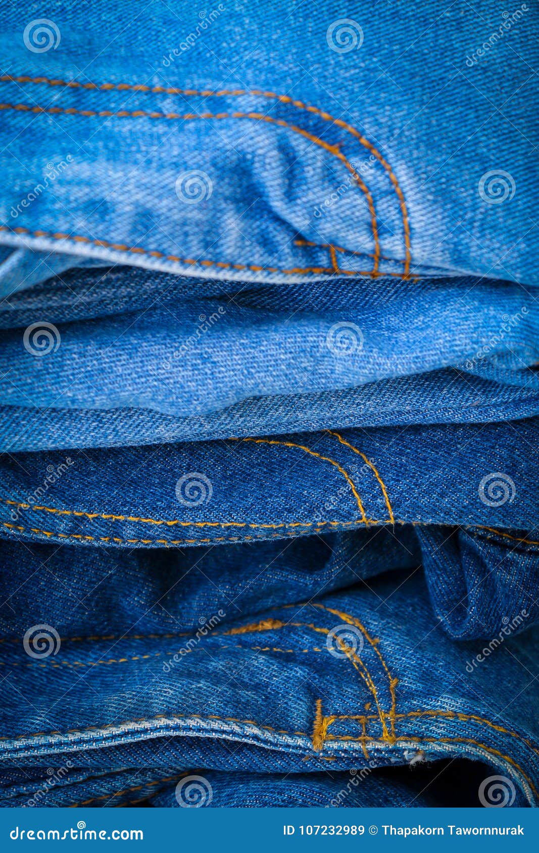 Stack of blue jeans stock image. Image of blue, folded - 107232989