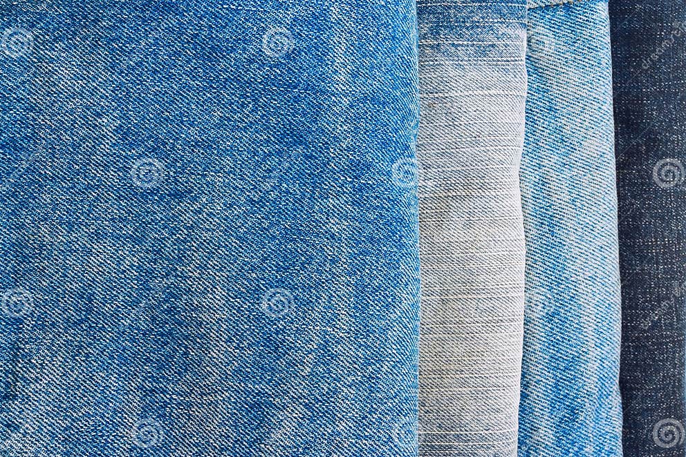 Stack of Blue Jeans Trousers As Background Stock Photo - Image of ...