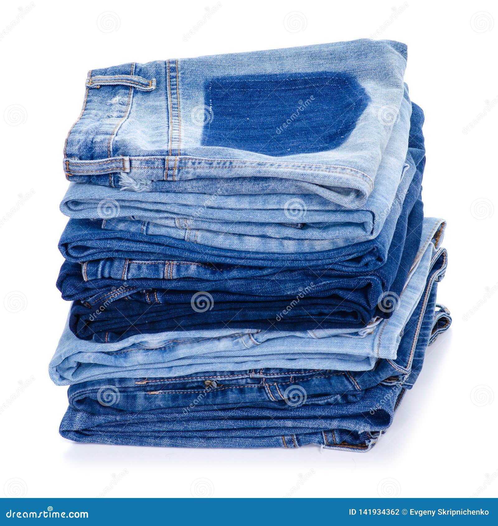 Stack blue jeans stock photo. Image of closeup, denim - 141934362