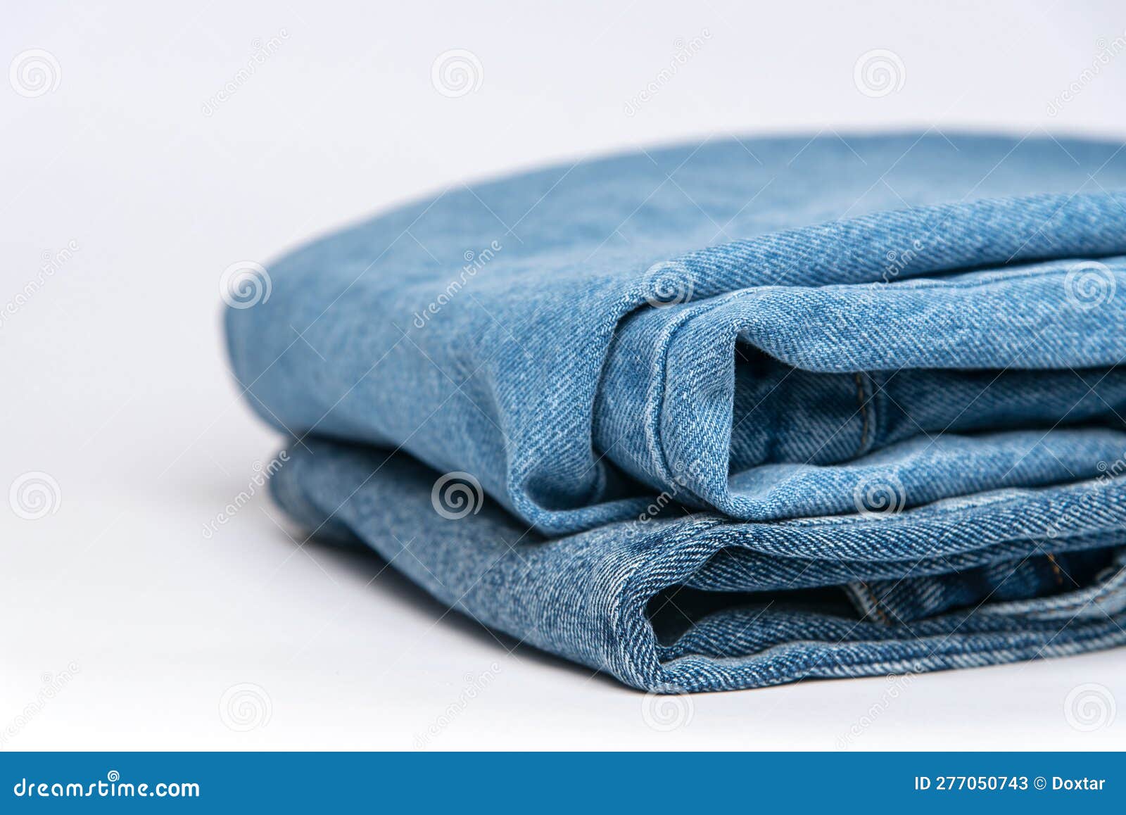 Stack of Blue Jeans on White Background Stock Image - Image of denim ...