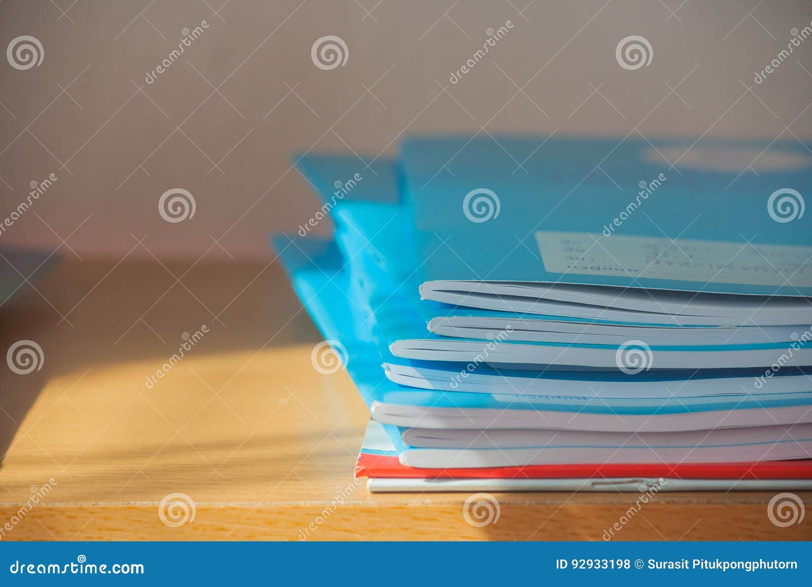 Stack of Blue Notebooks on Wooden Table. Stock Photo - Image of object ...