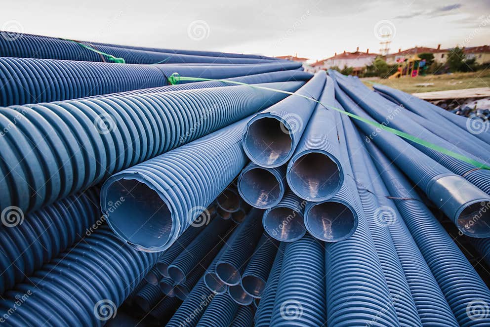 Stack of Blue Pvc Pipes stock image. Image of electricity - 38996695