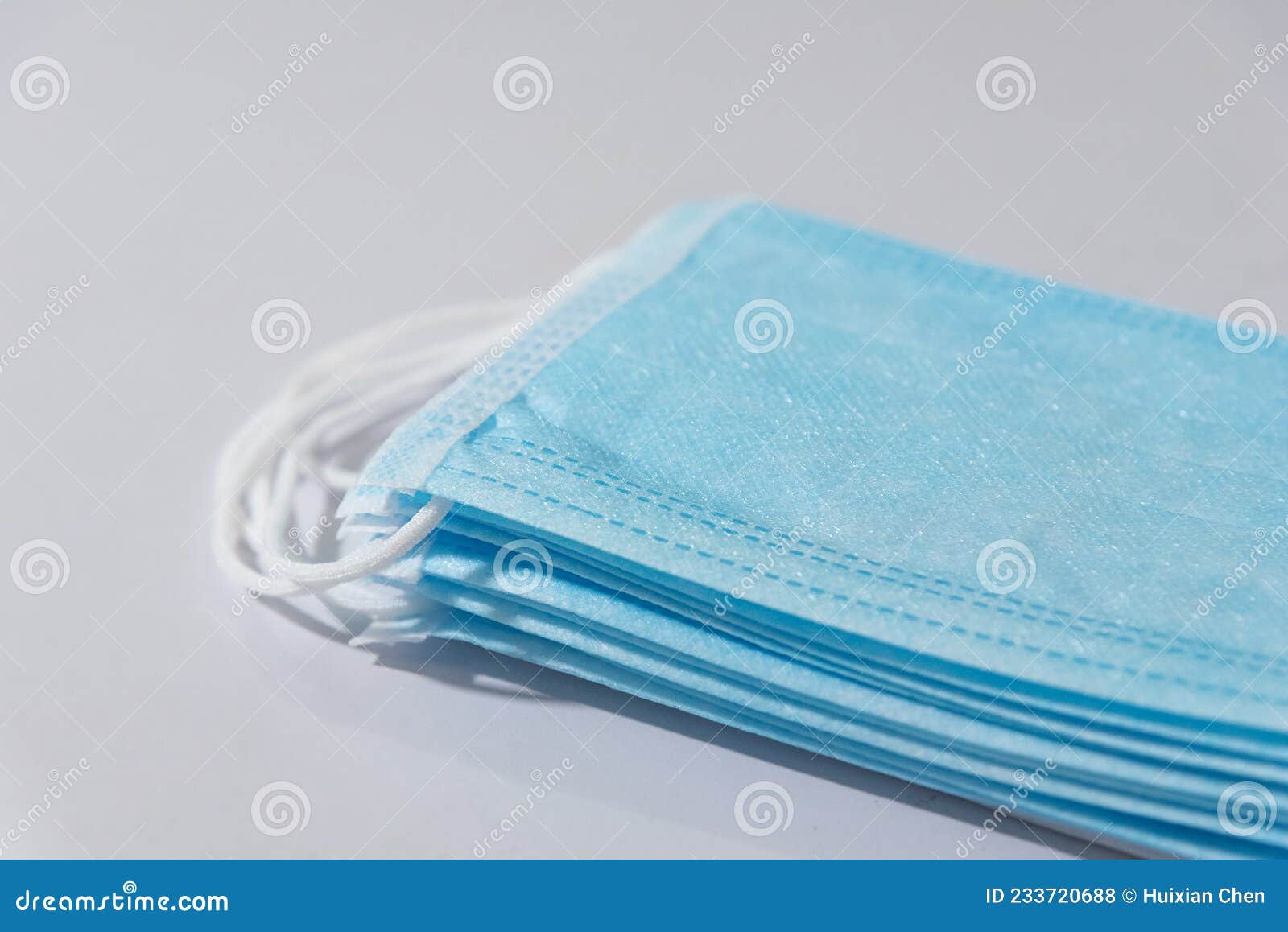 Stack of Blue Surgical Masks Isolated on White Background Stock Photo ...
