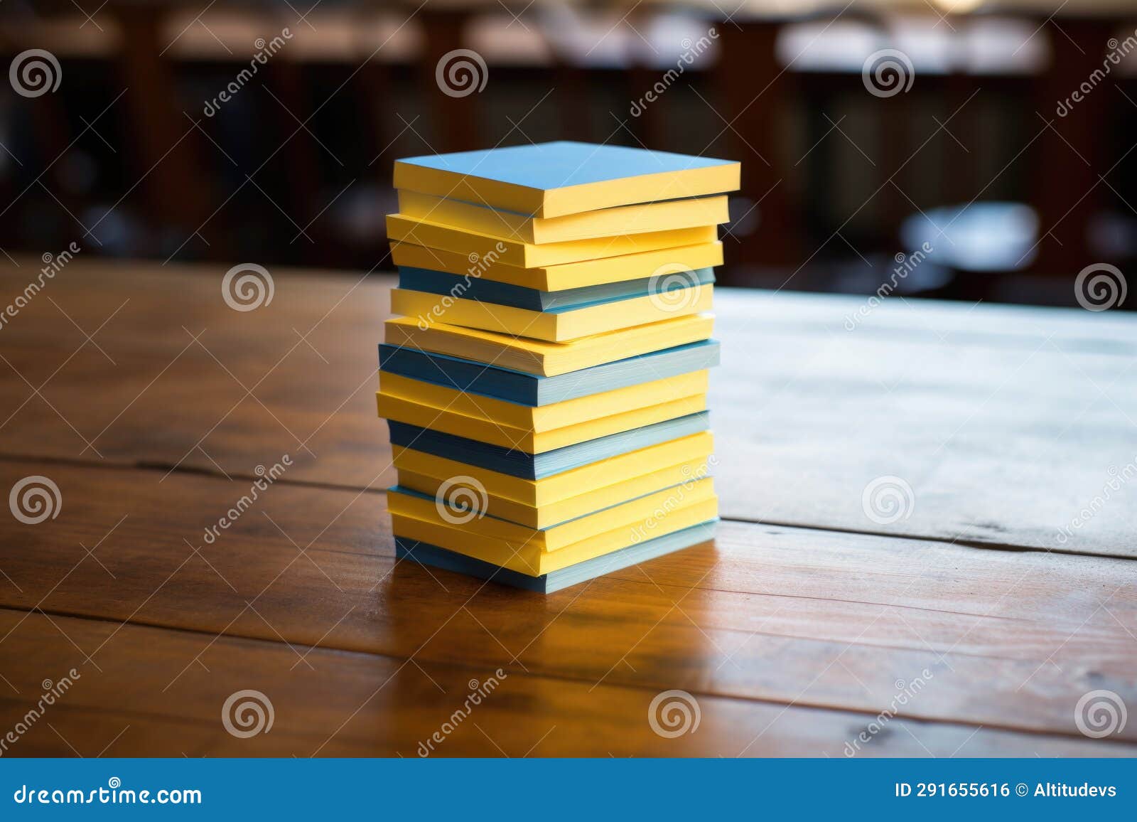Stack of Blue and Yellow Sticky Notes on a Table Stock Photo - Image of ...