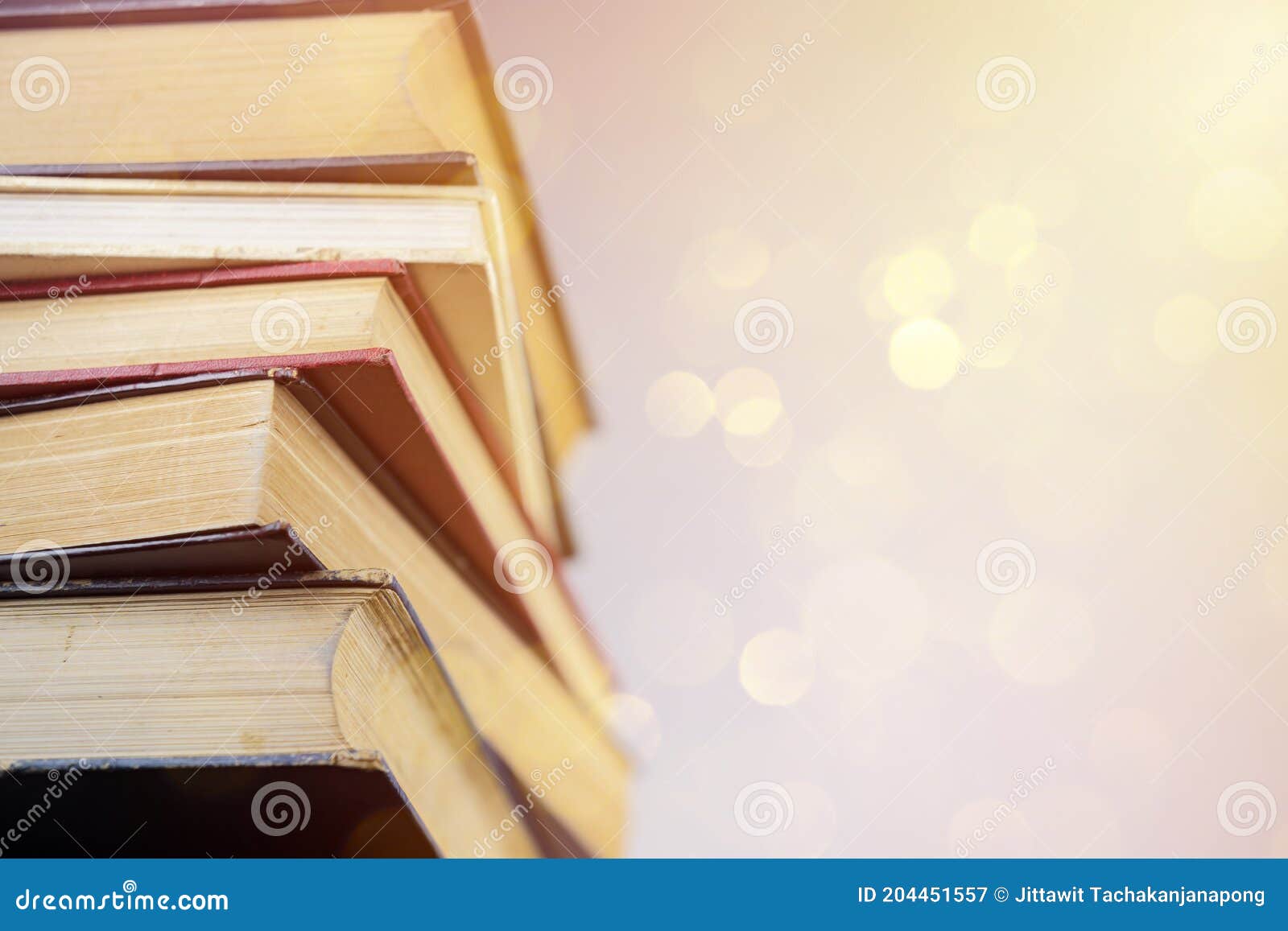 Stack of Books Against Blue Sky. Abstract Blurred Nature Scene Backdrop ...