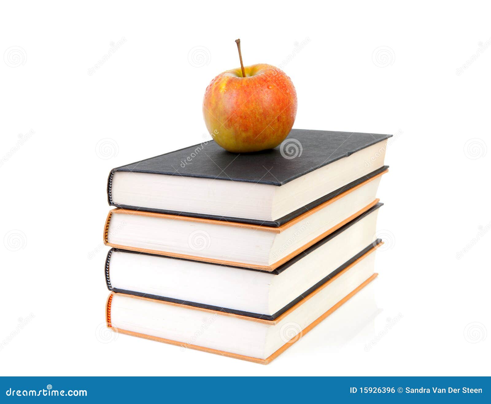 Stack of books with apple stock photo. Image of books - 15926396