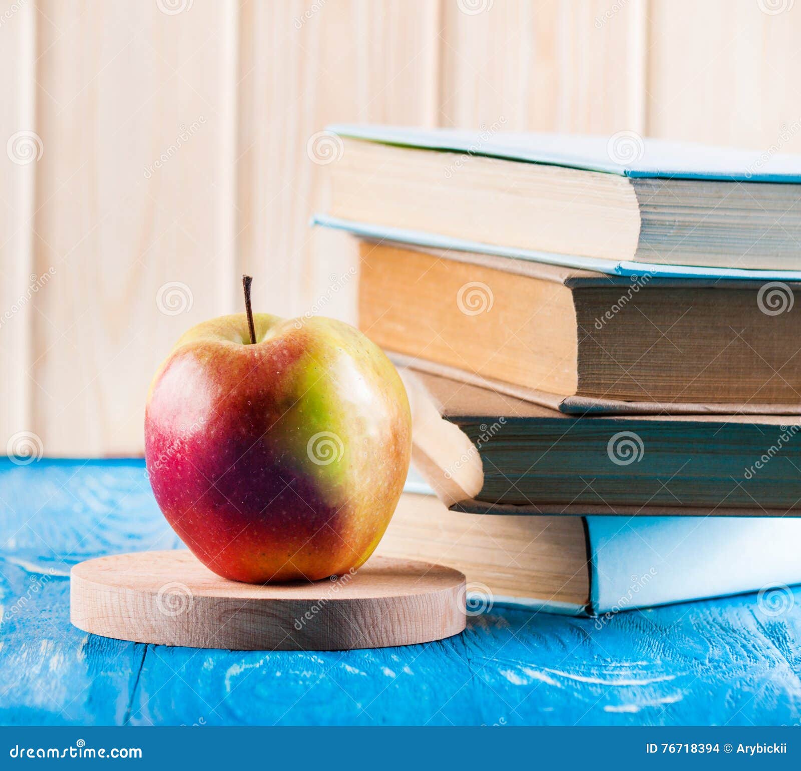 Stack of books and apple stock photo. Image of learn - 76718394