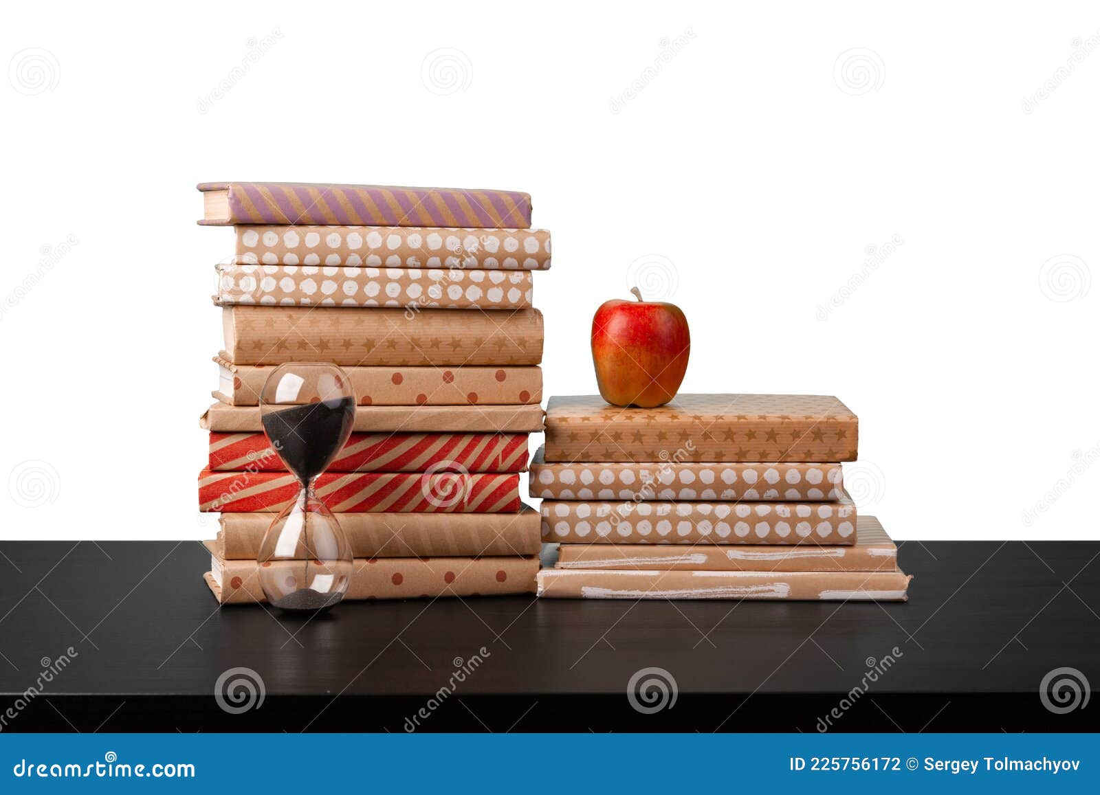 Stack of Books and Apple on Tabletop Against White Background Stock ...