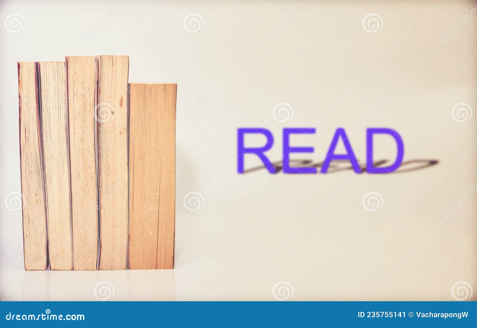 Stack of Books Arranged Horizontally on White Background Blur Read Word ...