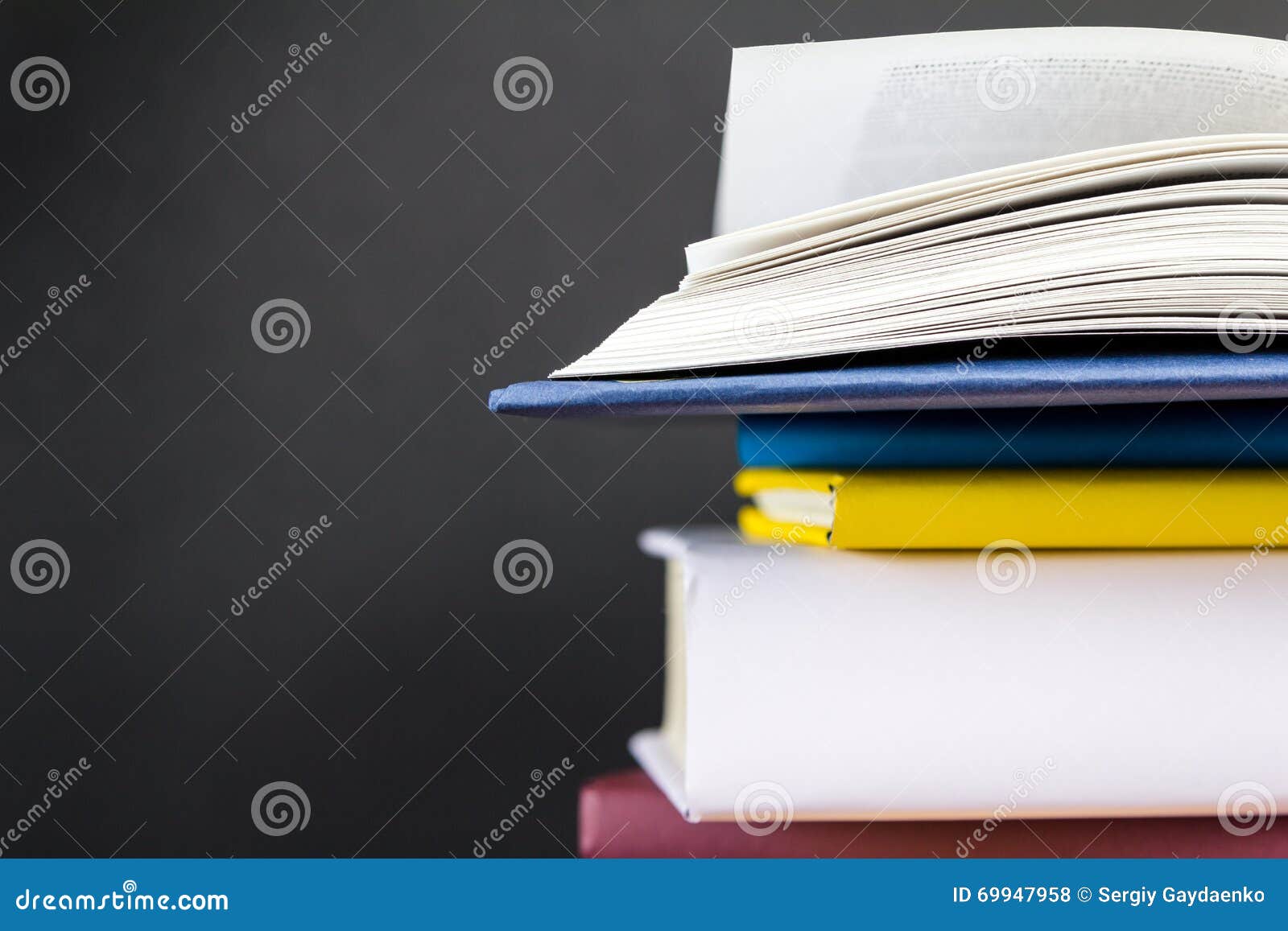 Stack of Books on Black Background Stock Photo - Image of brown ...