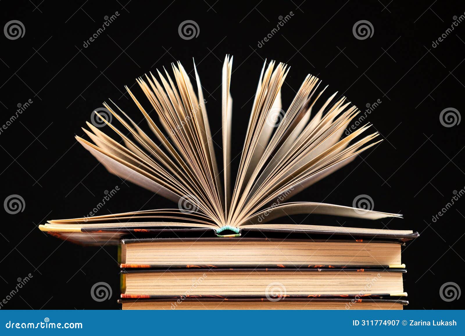 Stack of Books on Black Background, Open Book. Stock Image - Image of ...