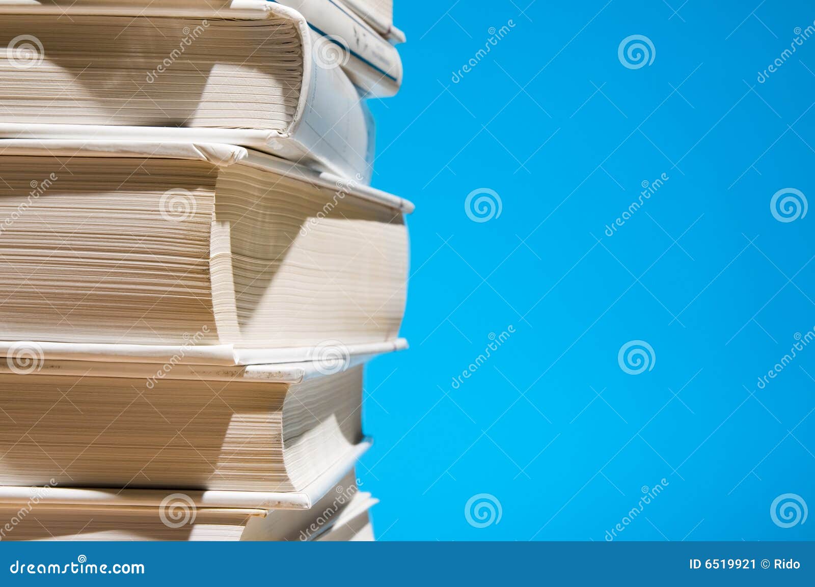Stack of books on blue stock image. Image of light, group - 6519921