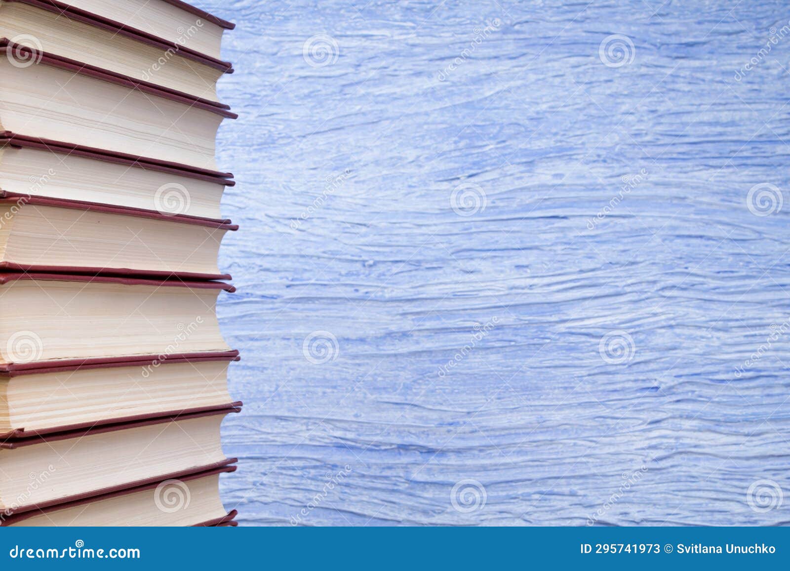 Stack of Books on the Blue Background. Back To School. Education Stock ...