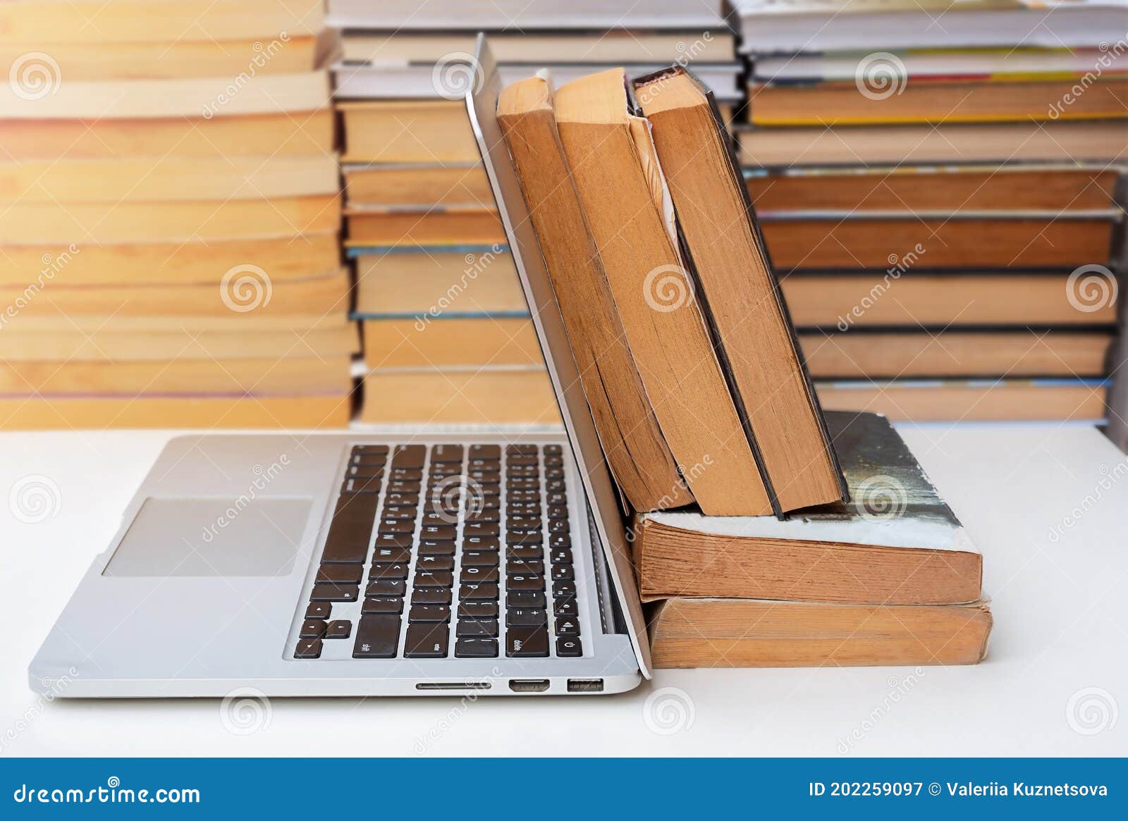 Stack of Books and a Computer on the Table Stock Image - Image of ...