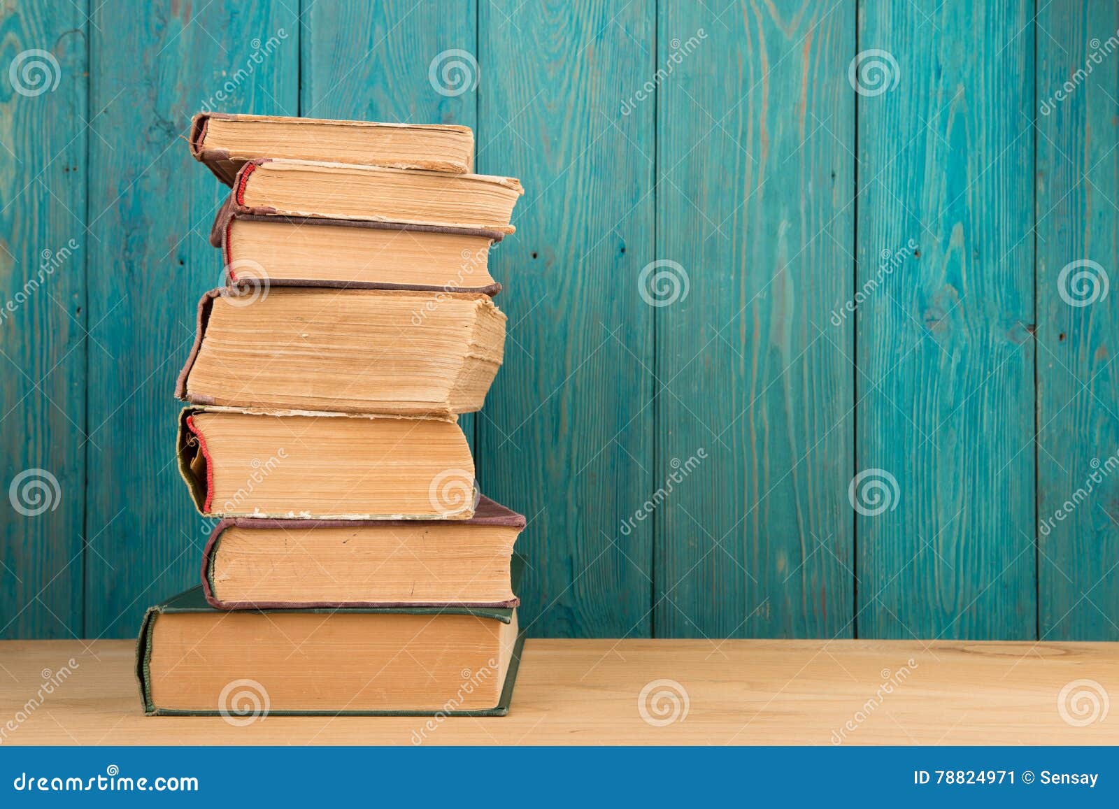 Stack of Books on the Desk Over Wooden Background Stock Image - Image ...