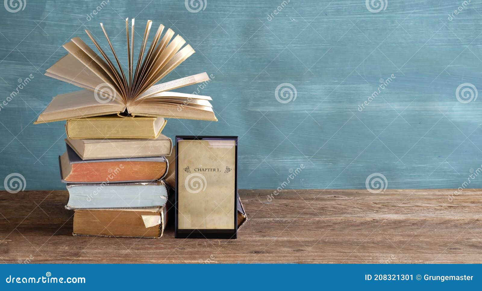 Stack of Books and an E-book Reader. E- Book, Book Fair,reading ...