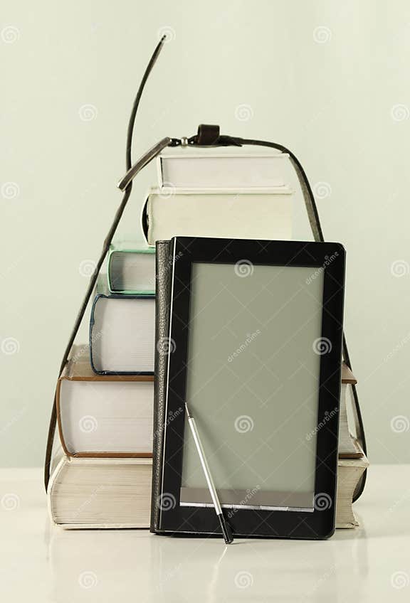 Stack of Books and Electronic Book Reader Stock Photo - Image of ...