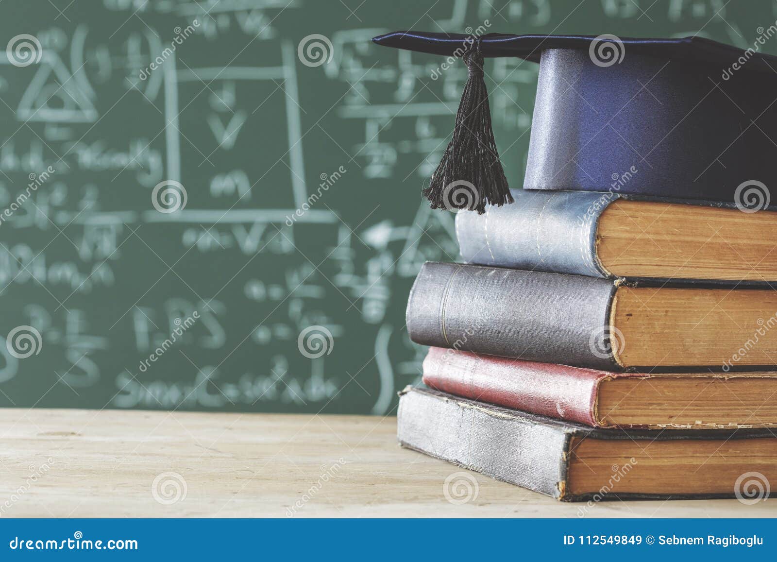 Stack Books Graduate Hat in Front of Green Chalkboard Stock Image ...