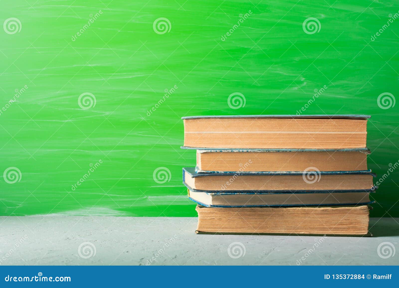 Stack of Books on Green Background Stock Photo - Image of still, space ...