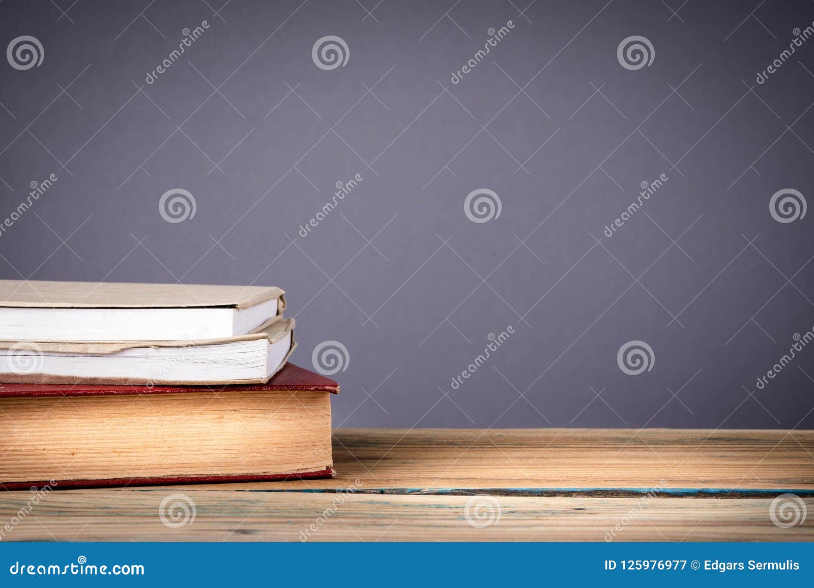 Stack of Books on Grey Background. Back To School with Copy Space Stock ...