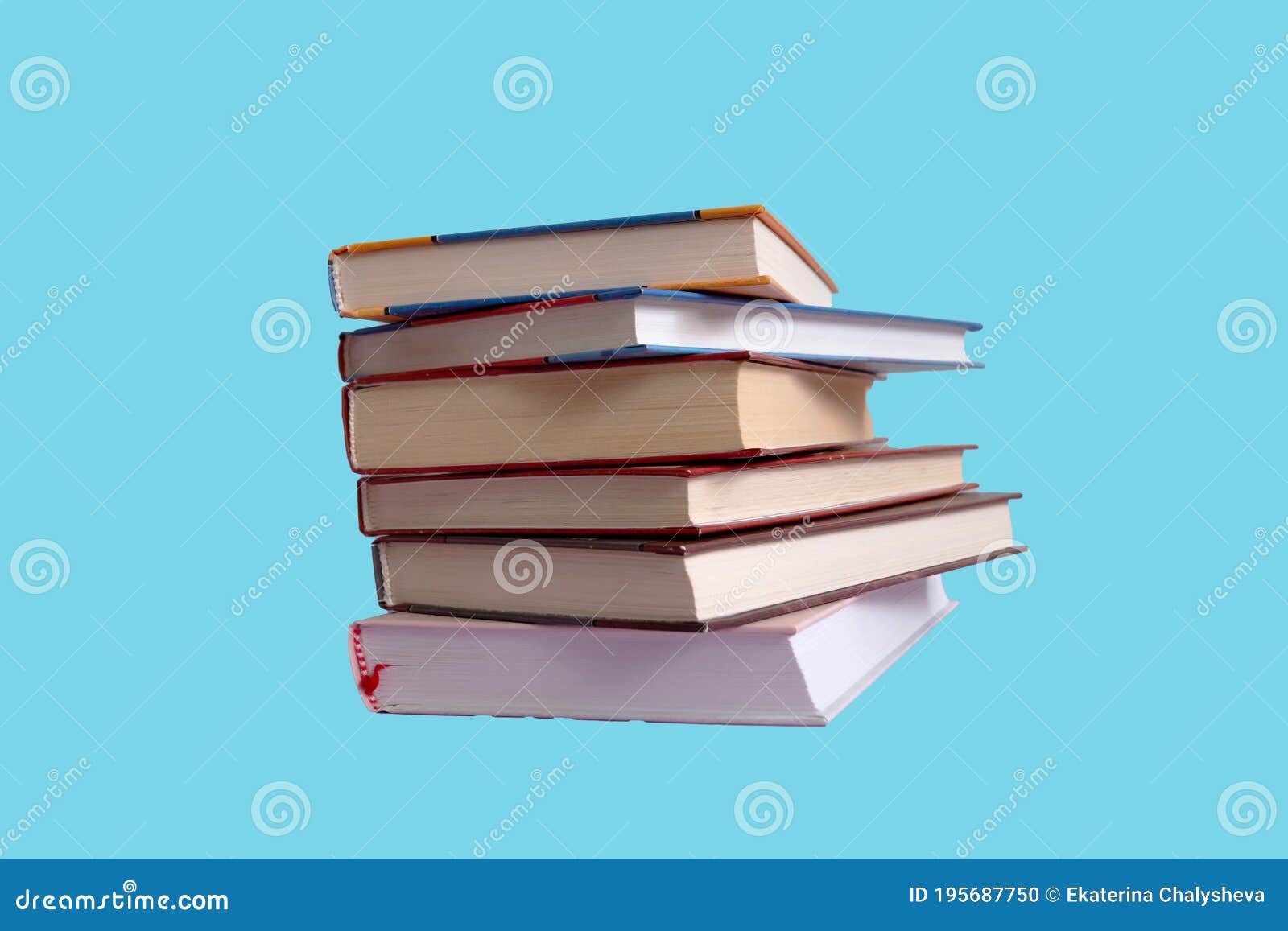Stack of Books Isolated on Light Blue Background. Minimalism Concept ...