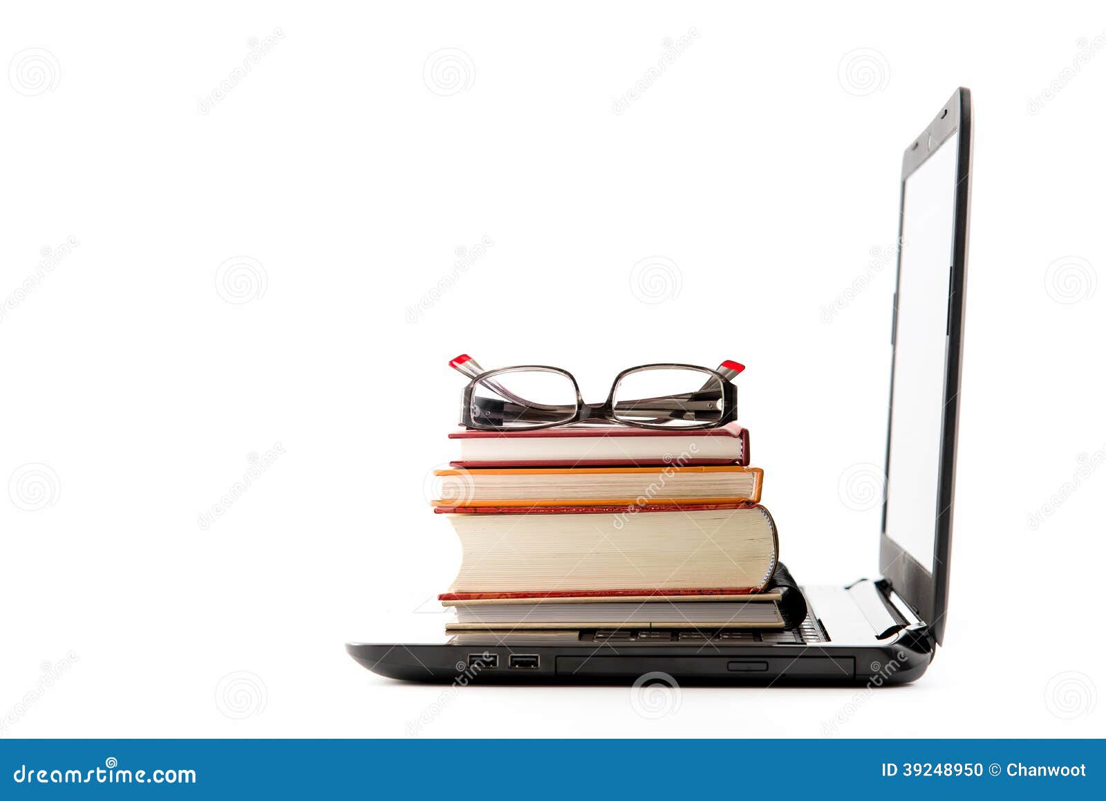 Stack of books on laptop stock photo. Image of still - 39248950