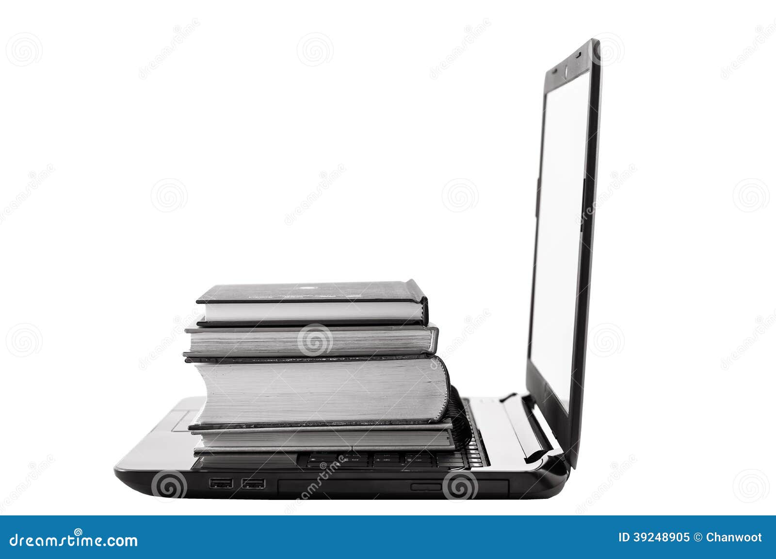 Stack of books on Laptop. stock image. Image of books - 39248905