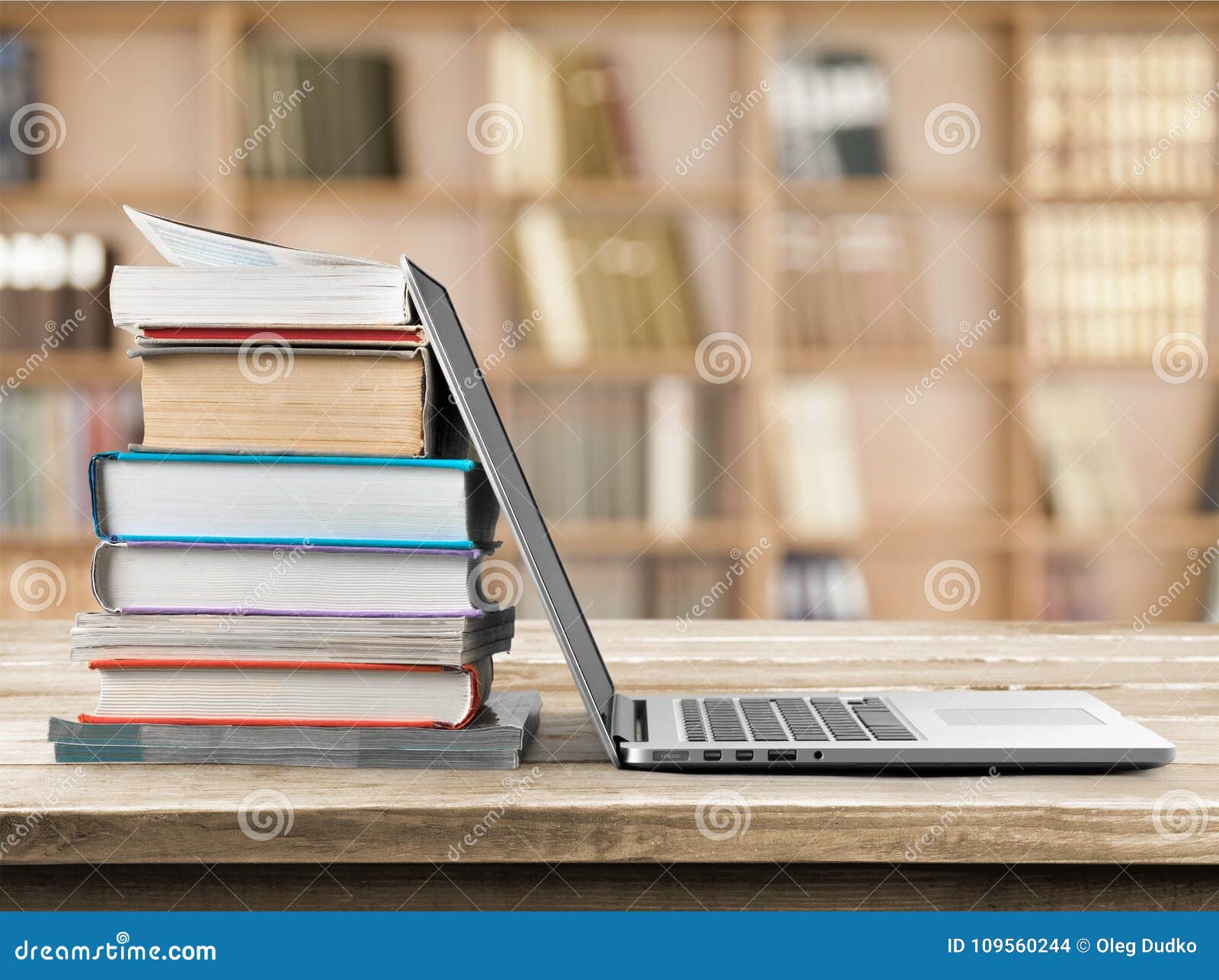 Stack of Books with Laptop on Wooden Table Stock Photo - Image of desk ...
