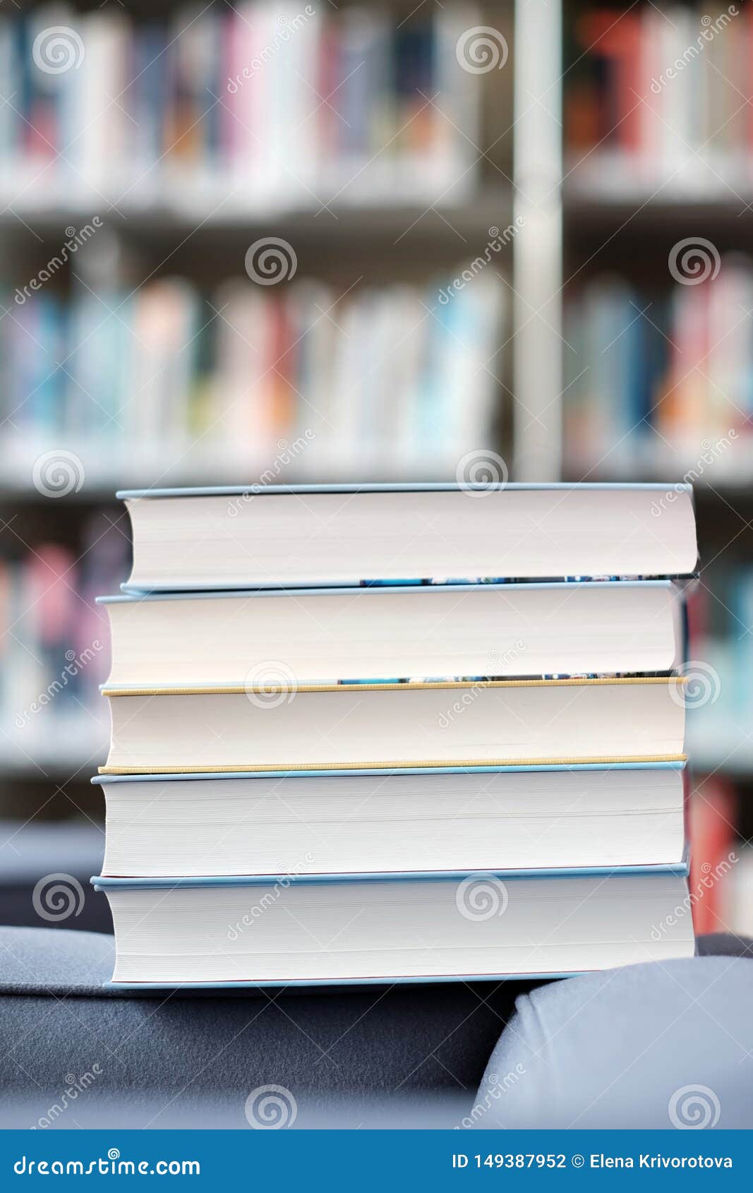 Stack of Books in a Library Stock Photo - Image of blue, schoolboy ...