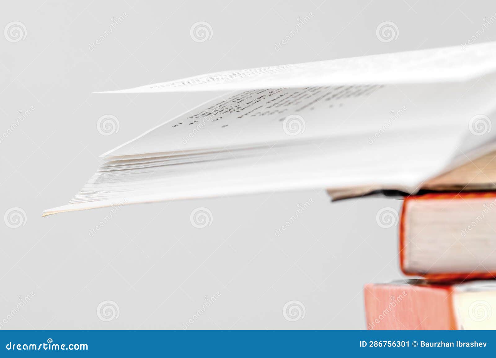 Stack of Books in Library, One of Them Open on Top, Multicolored Book ...