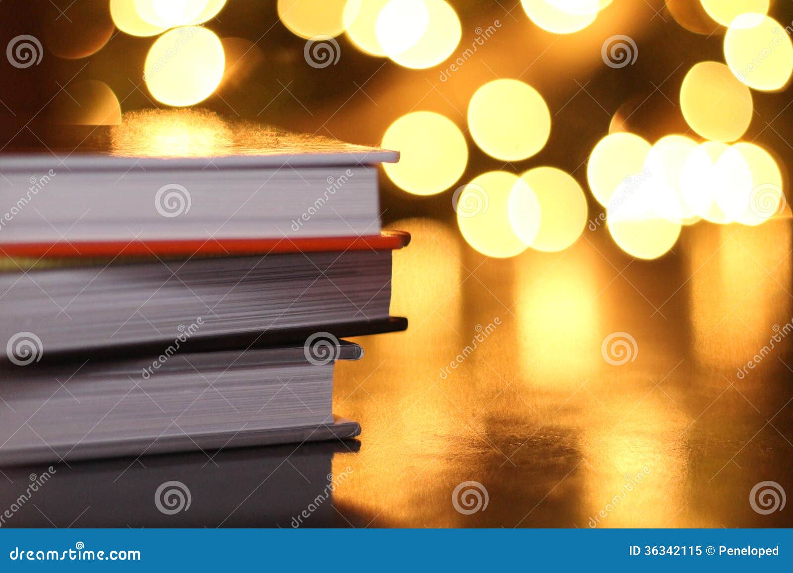 Stack of Books with Lights stock image. Image of christmas - 36342115