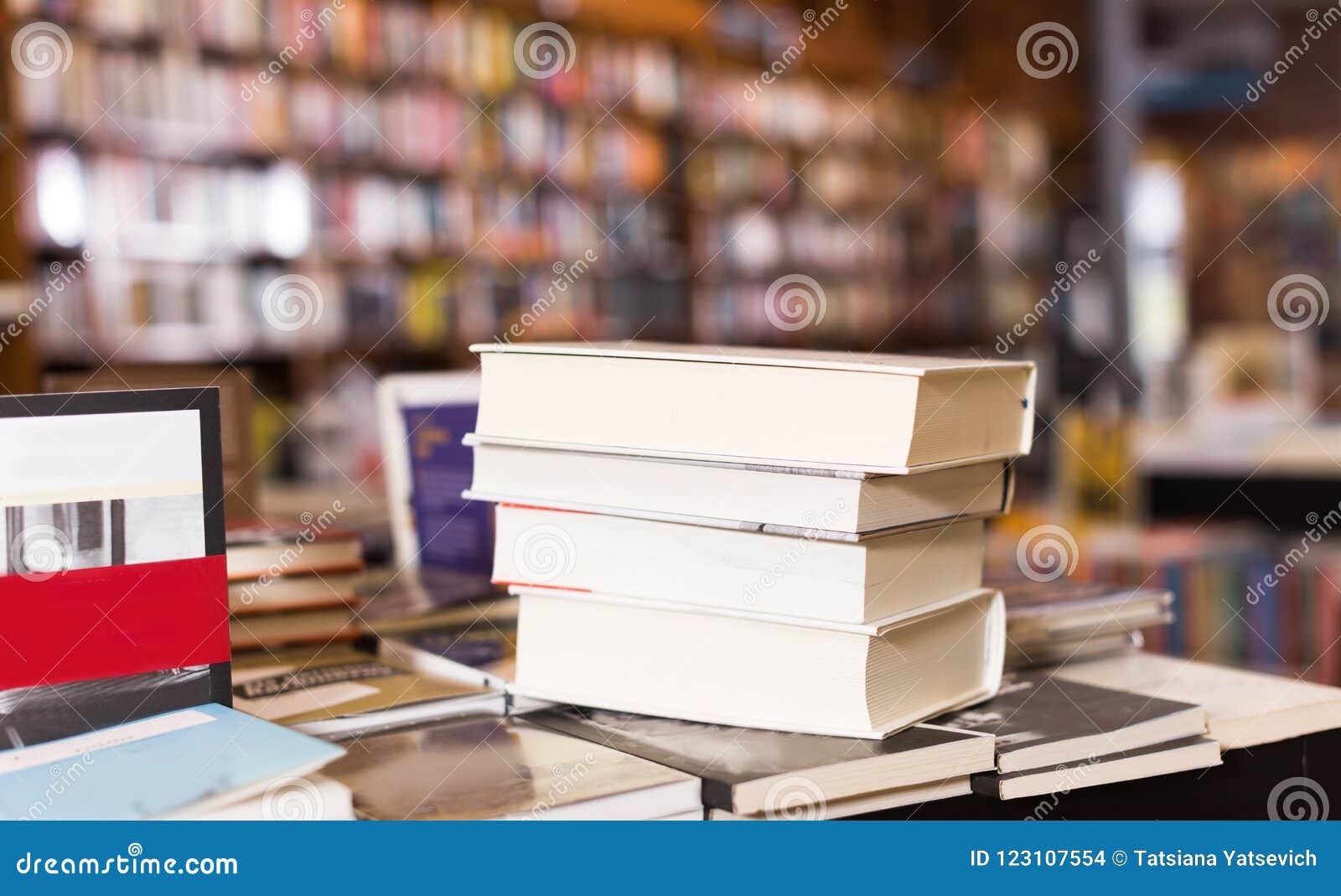 Stack of Books Lying on Table in Bookstore Stock Photo - Image of ...