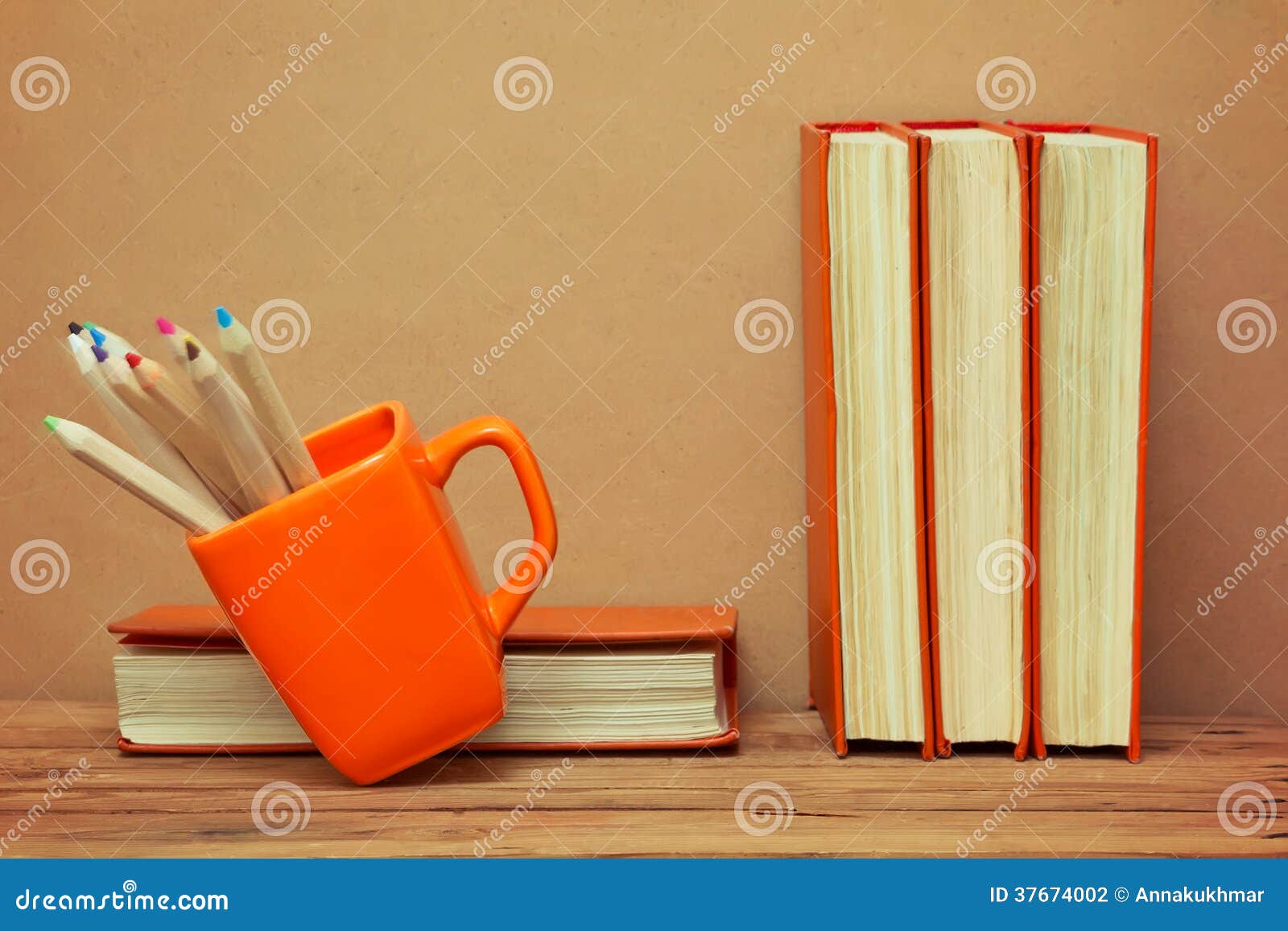 Stack of Books and Mug with Colored Pencils Stock Photo - Image of ...