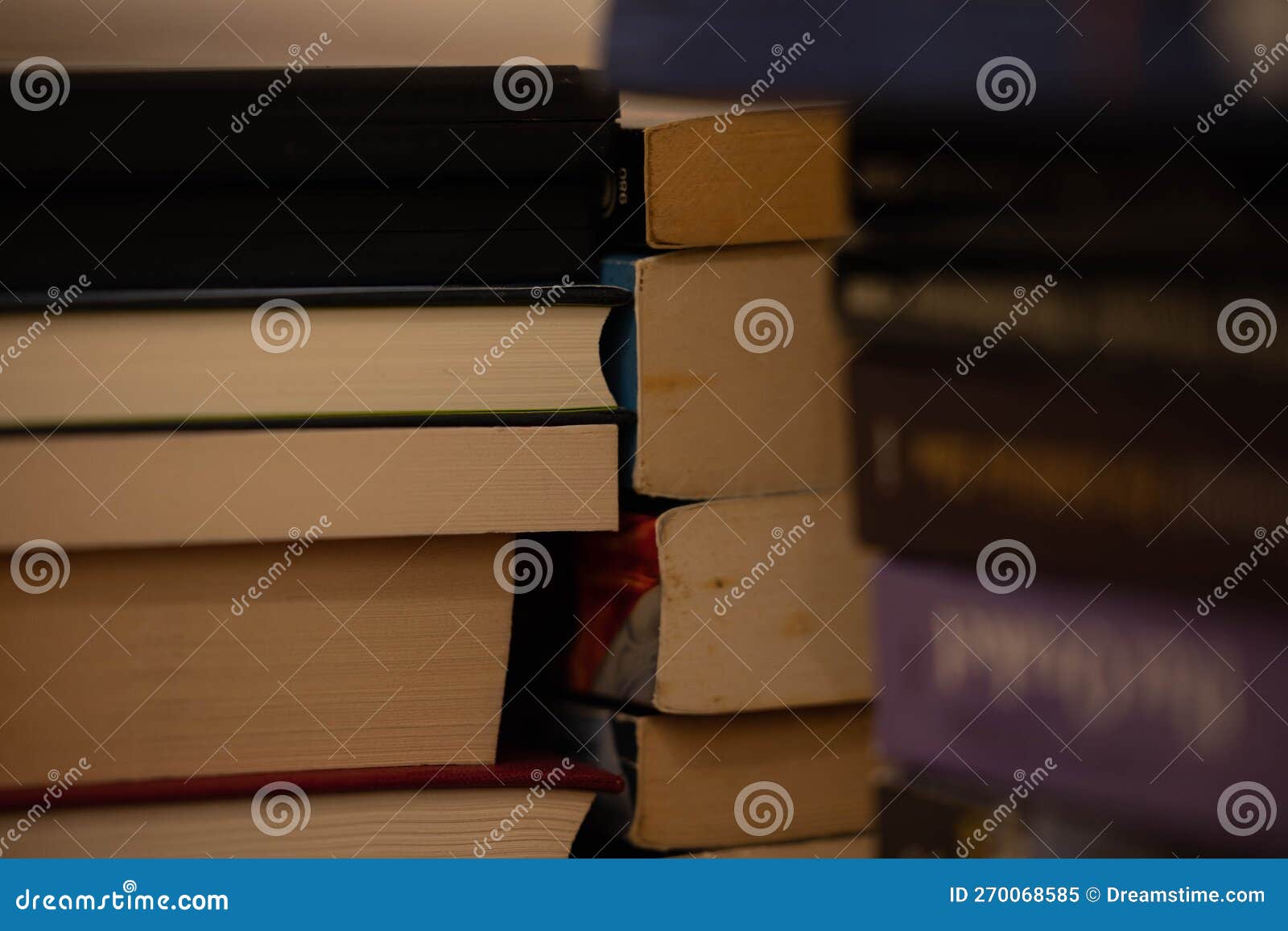Stack of Books Next To Each Other on a Table Stock Image - Image of ...