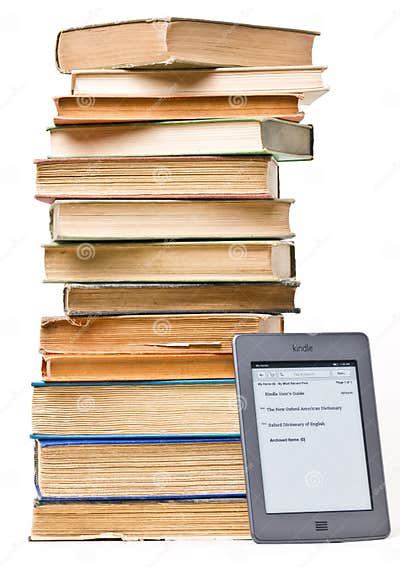 Stack of Books Next To Kindle Touch EReader Editorial Photo - Image of ...