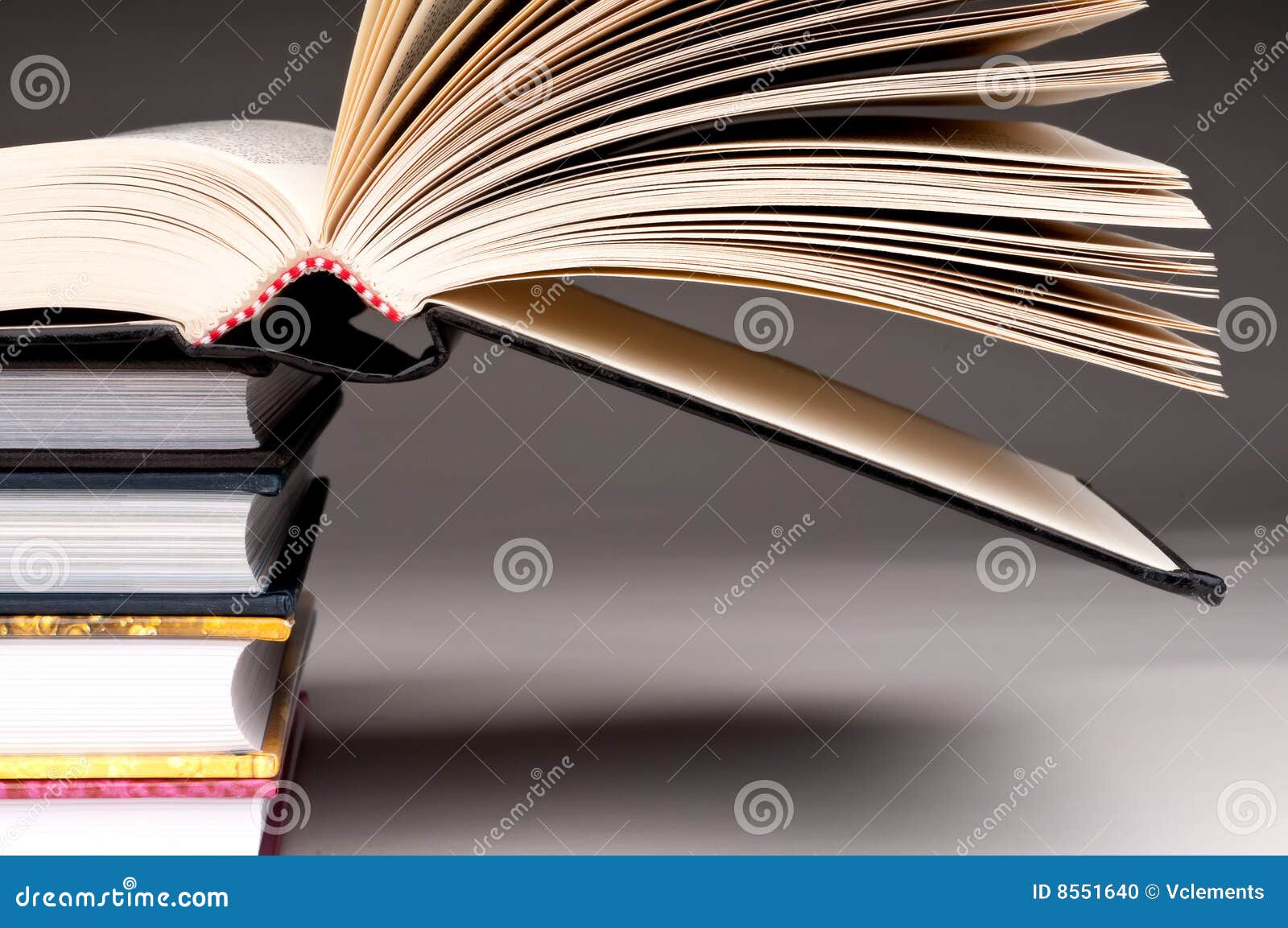 A Stack of Books with One Open Stock Photo - Image of published, word ...