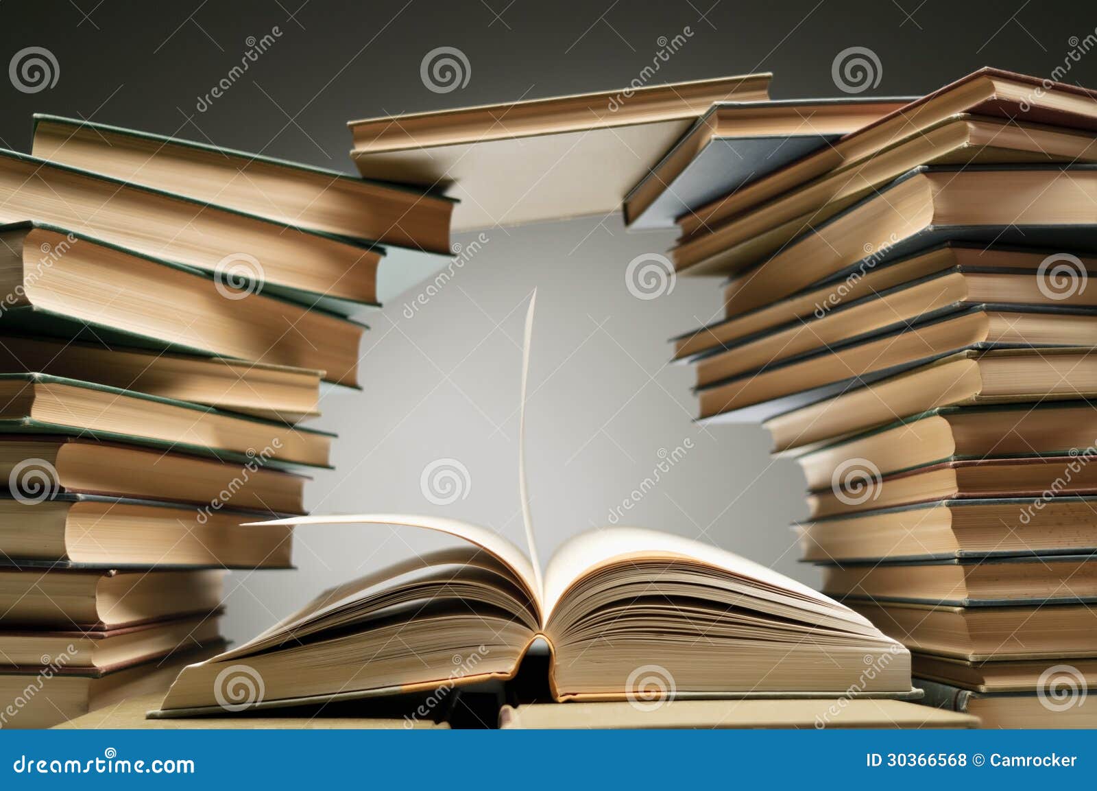 Stack of Books with One Open among Them Stock Photo - Image of flipping ...