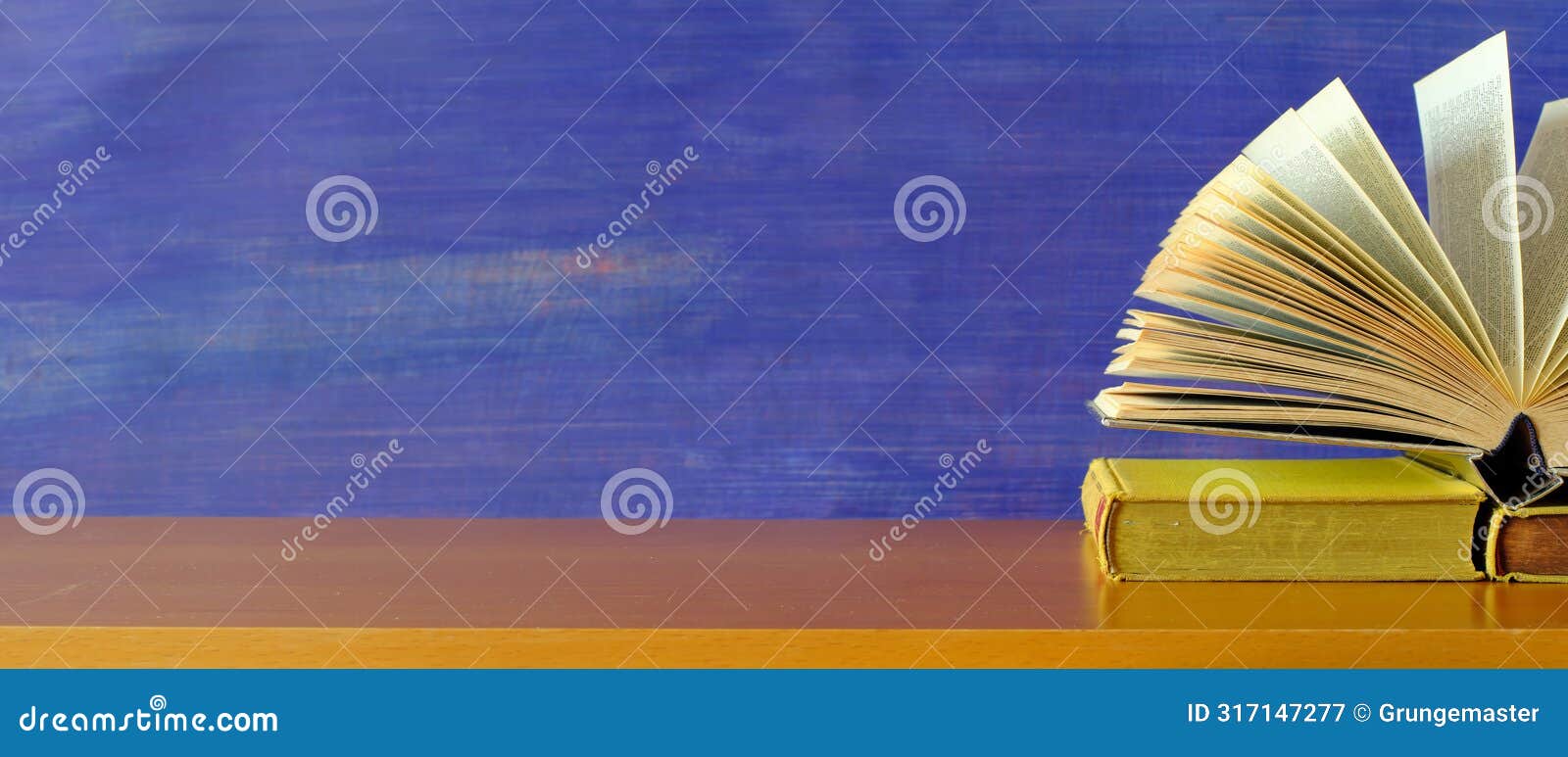 Stack of Books with Open Book.Close-up Shot of Book Pages, Reading ...