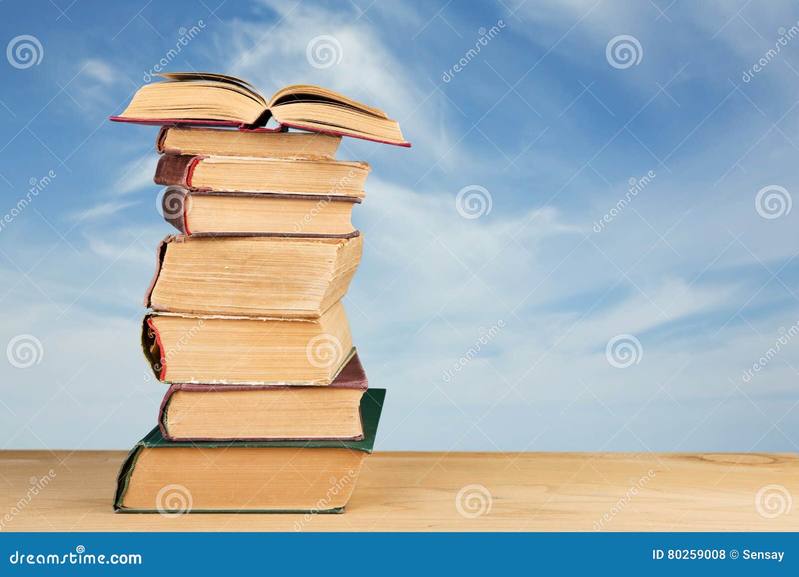 Stack of Books Over the Natural Background Stock Photo - Image of aged ...