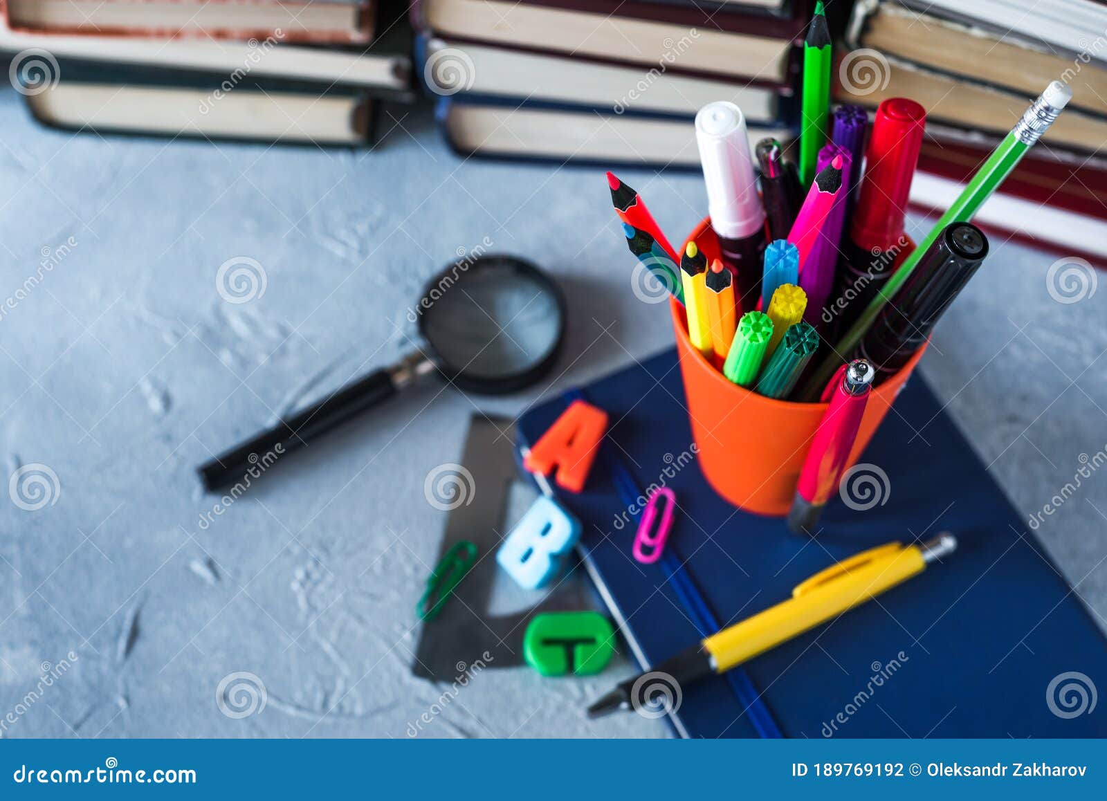 A Stack of Books and Pencils on a Desk in Elementary School. a Stack of ...