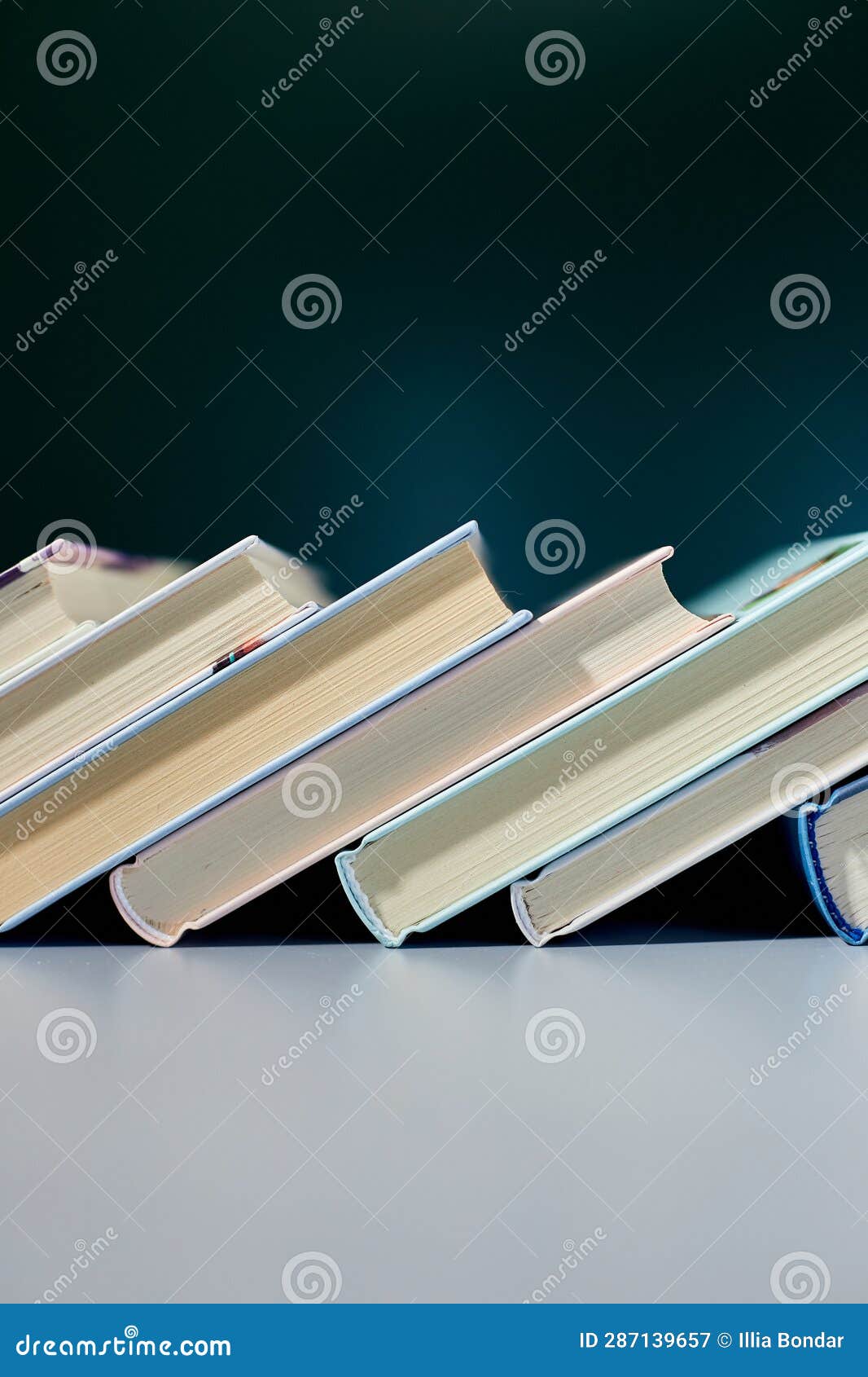 Stack of Books in a Row with on Dark Background Stock Image - Image of ...