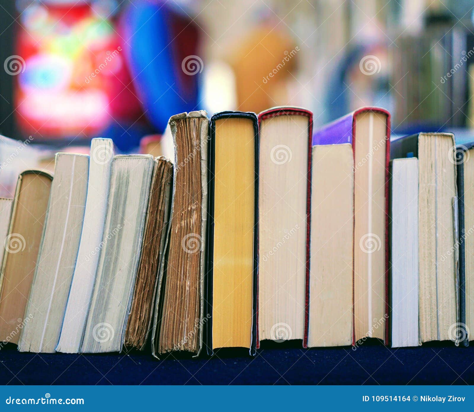 A Stack of Books on the Shelf Stock Photo - Image of lecture ...