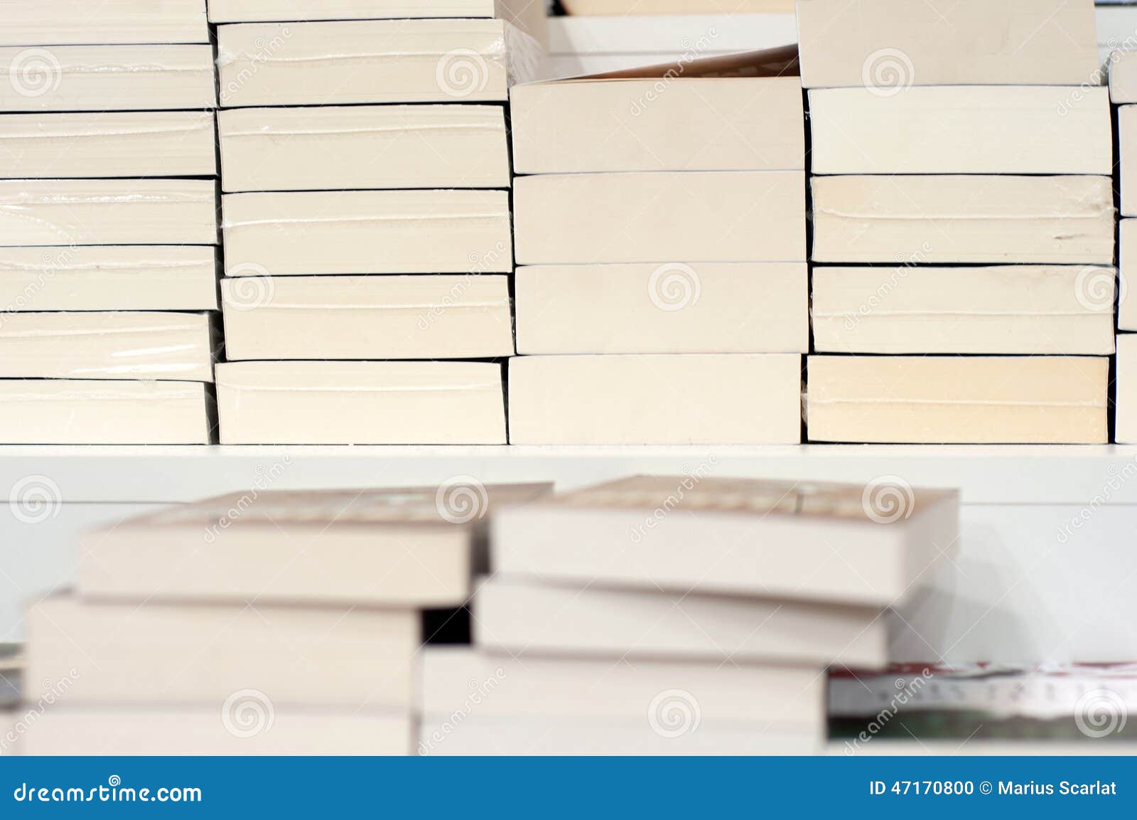 Stack of books on a shelf stock photo. Image of book - 47170800