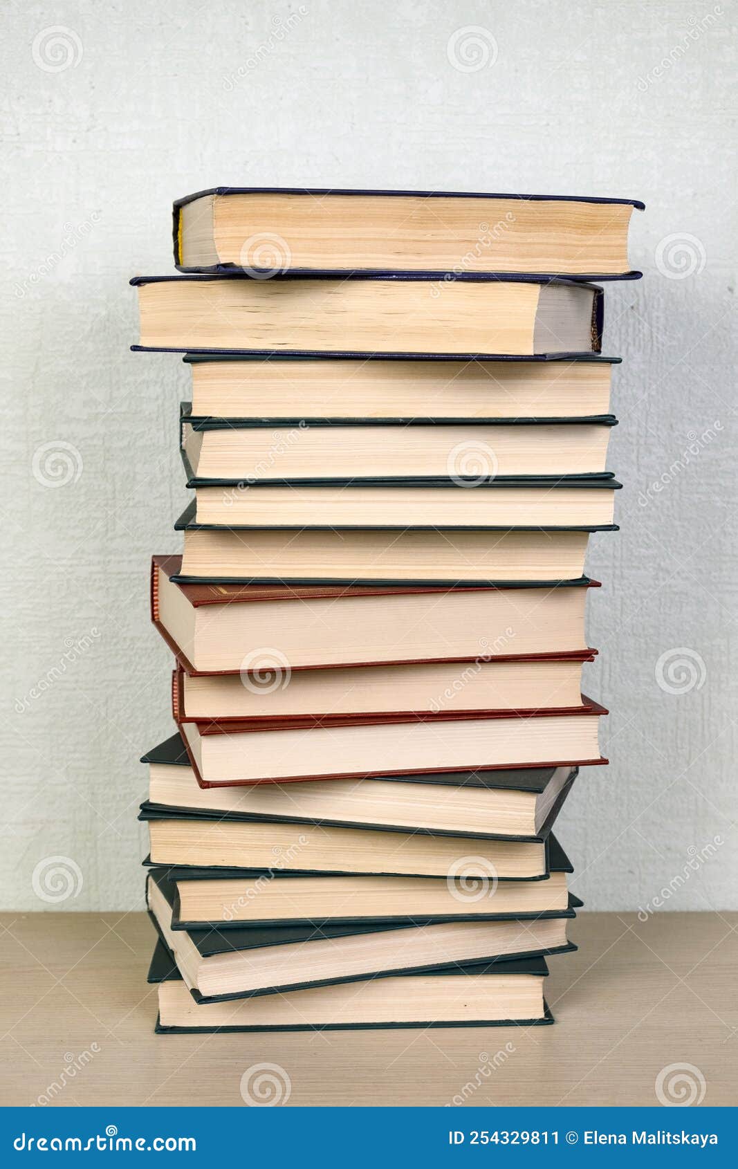 A Stack of Books on a Shelf in a Library. Concept Reading, Education ...