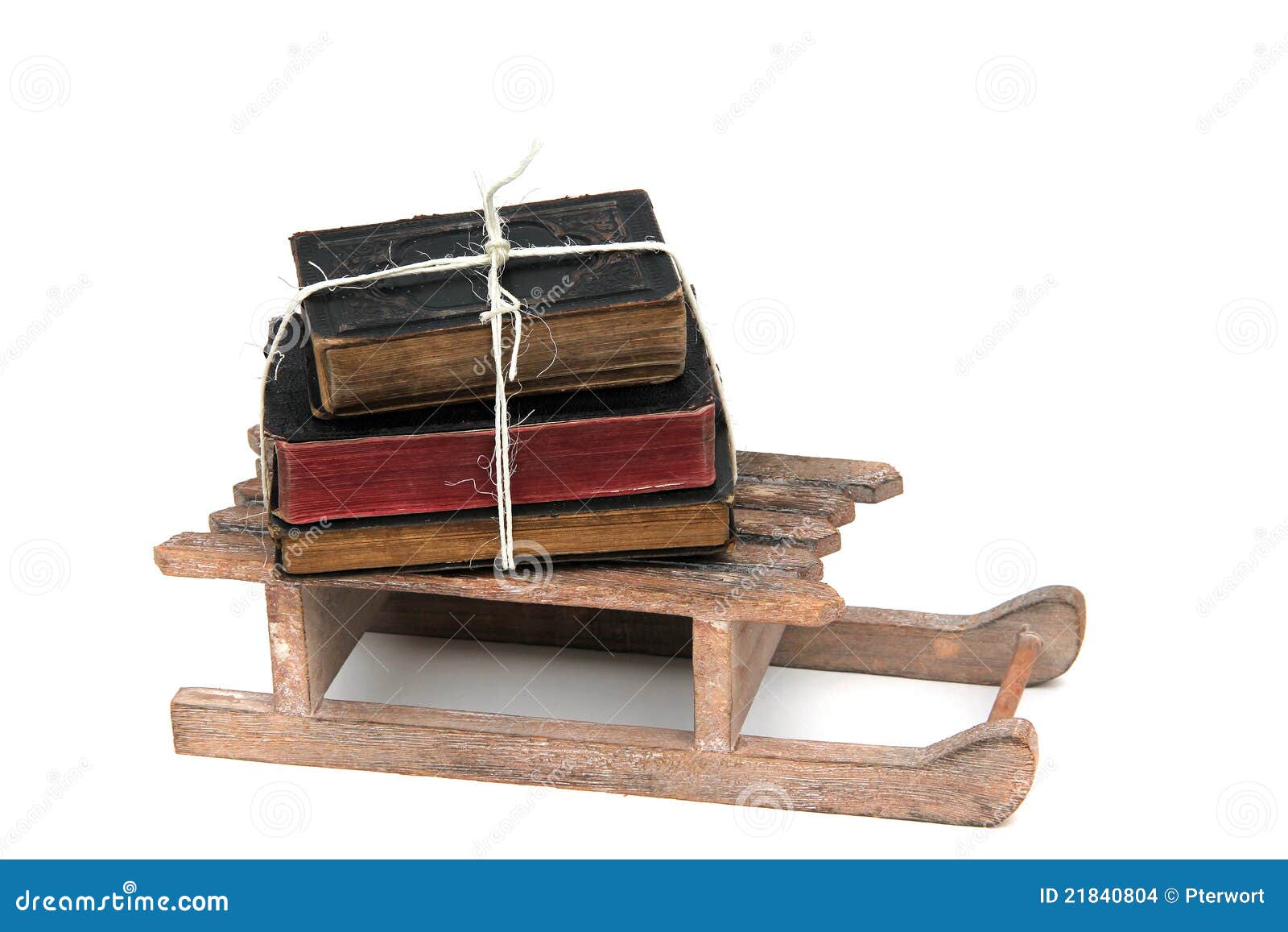 Stack of books on sledge stock photo. Image of conceptual - 21840804